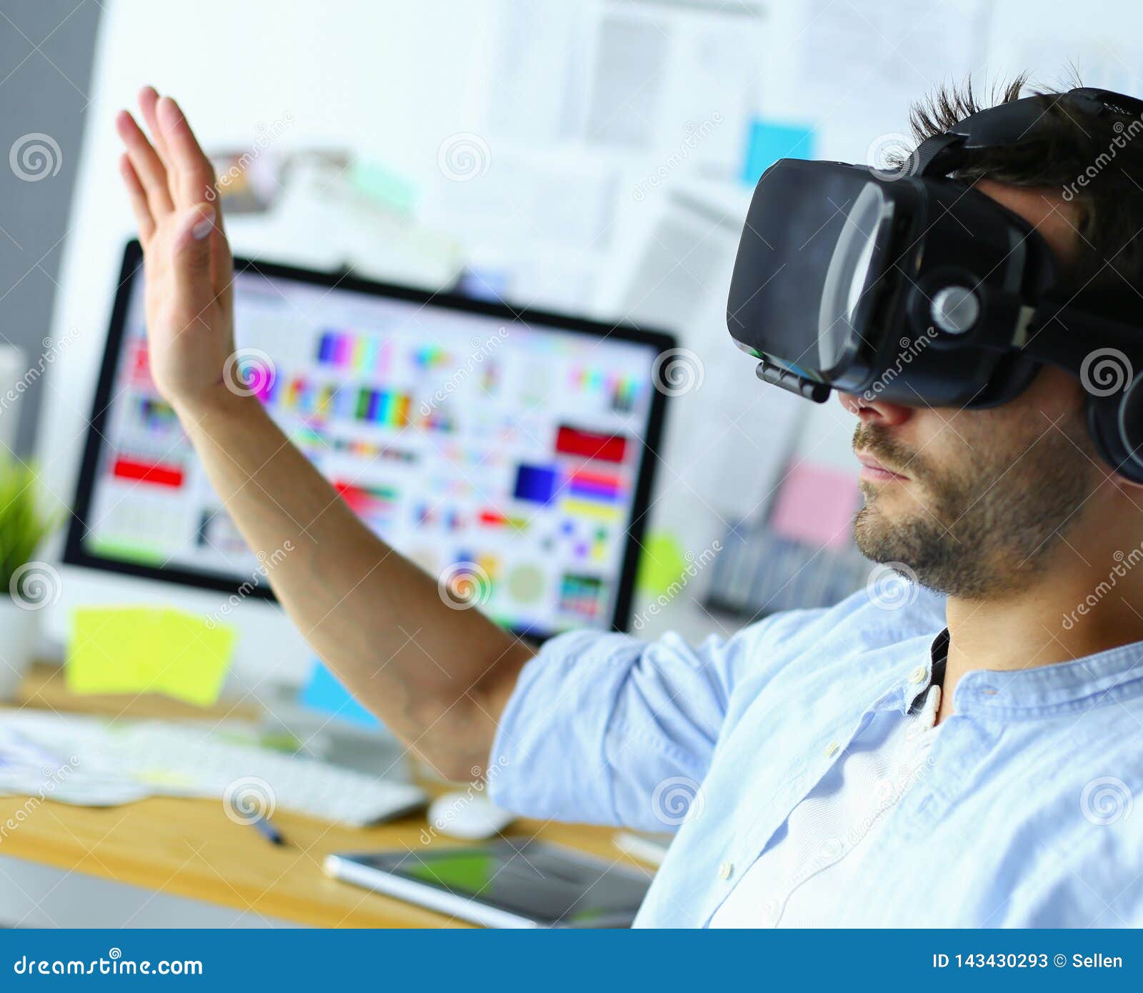 Young Male Software Programmer Testing a New App with 3d Virtual ...