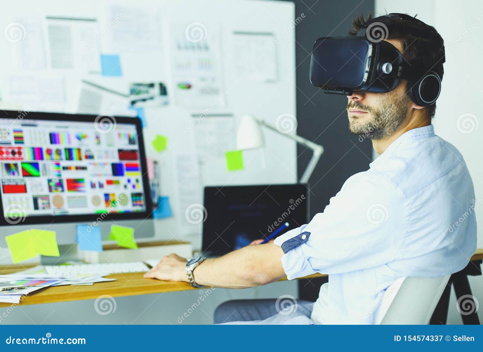 Young Male Software Programmer Testing a New App with 3d Virtual ...