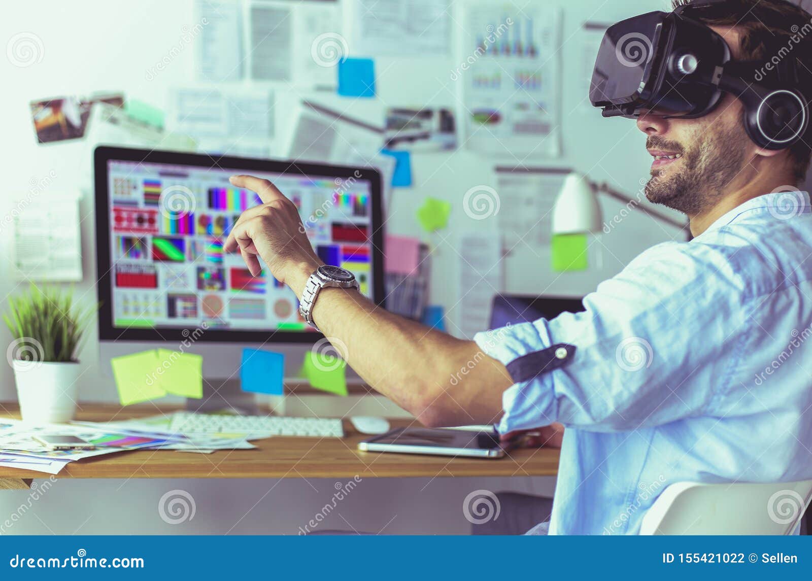 Young Male Software Programmer Testing a New App with 3d Virtual ...