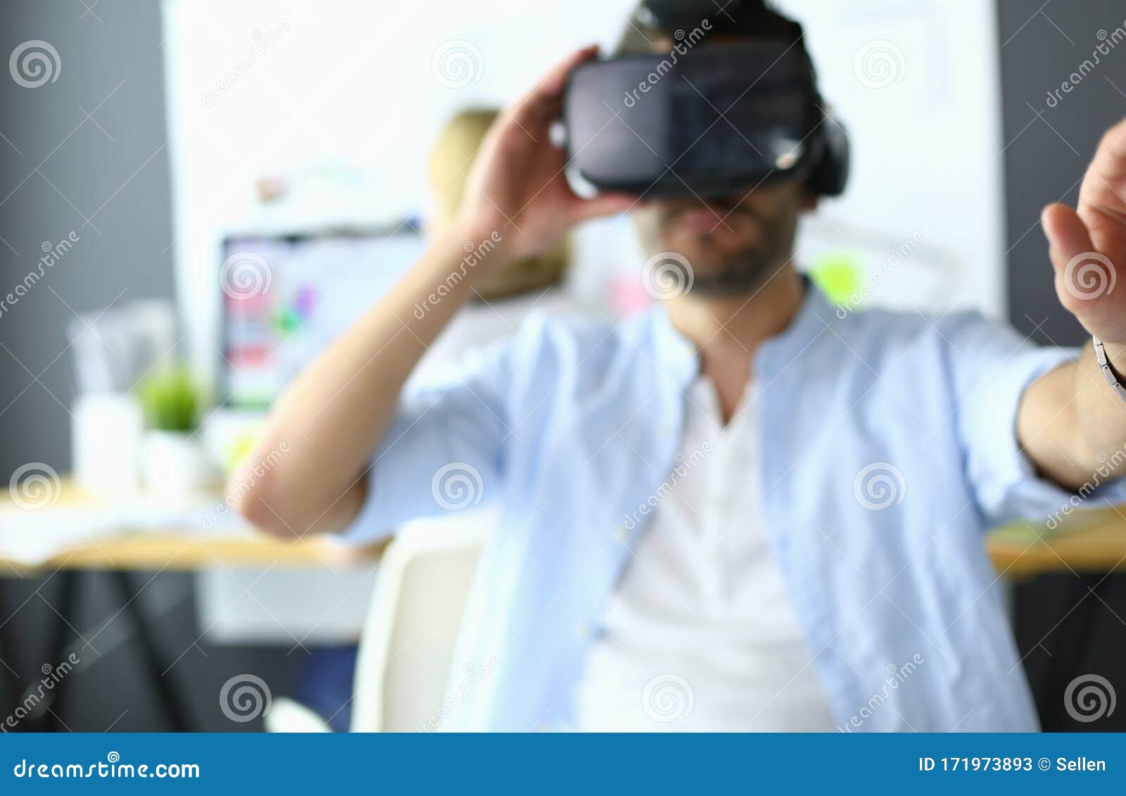 Young Male Software Programmer Testing a New App with 3d Virtual ...