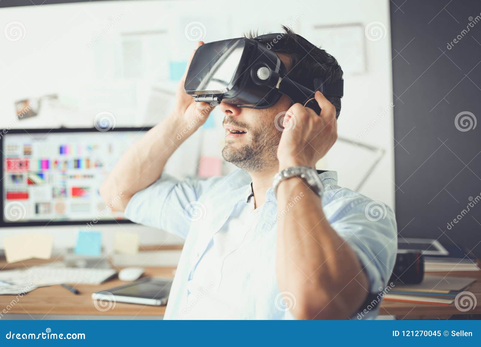 Young Male Software Programmer Testing a New App with 3d Virtual ...