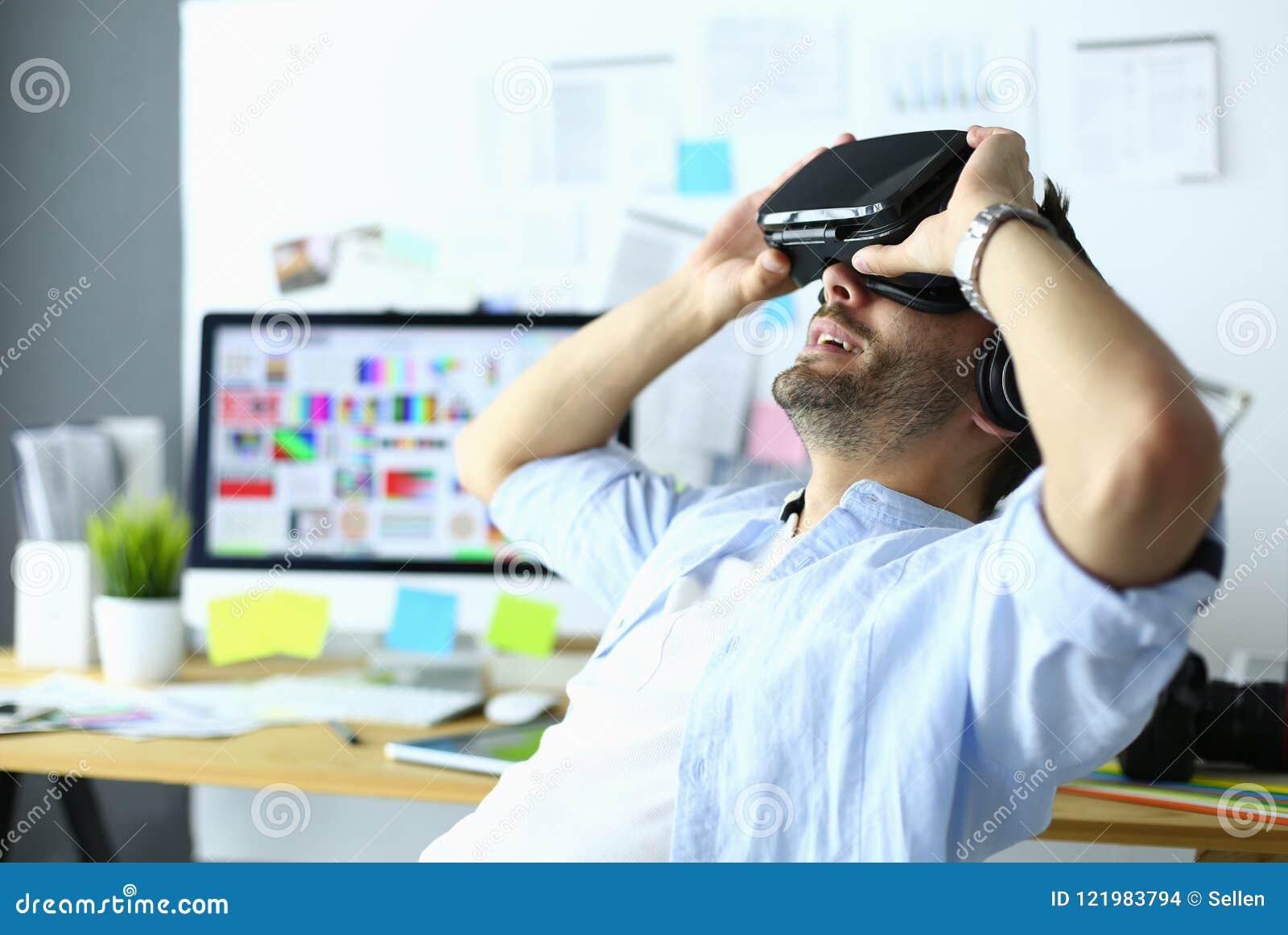 Young Male Software Programmer Testing a New App with 3d Virtual ...