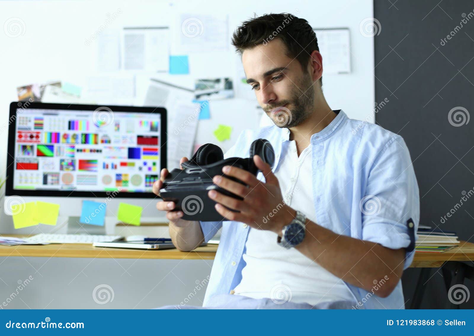 Young Male Software Programmer Testing a New App with 3d Virtual ...