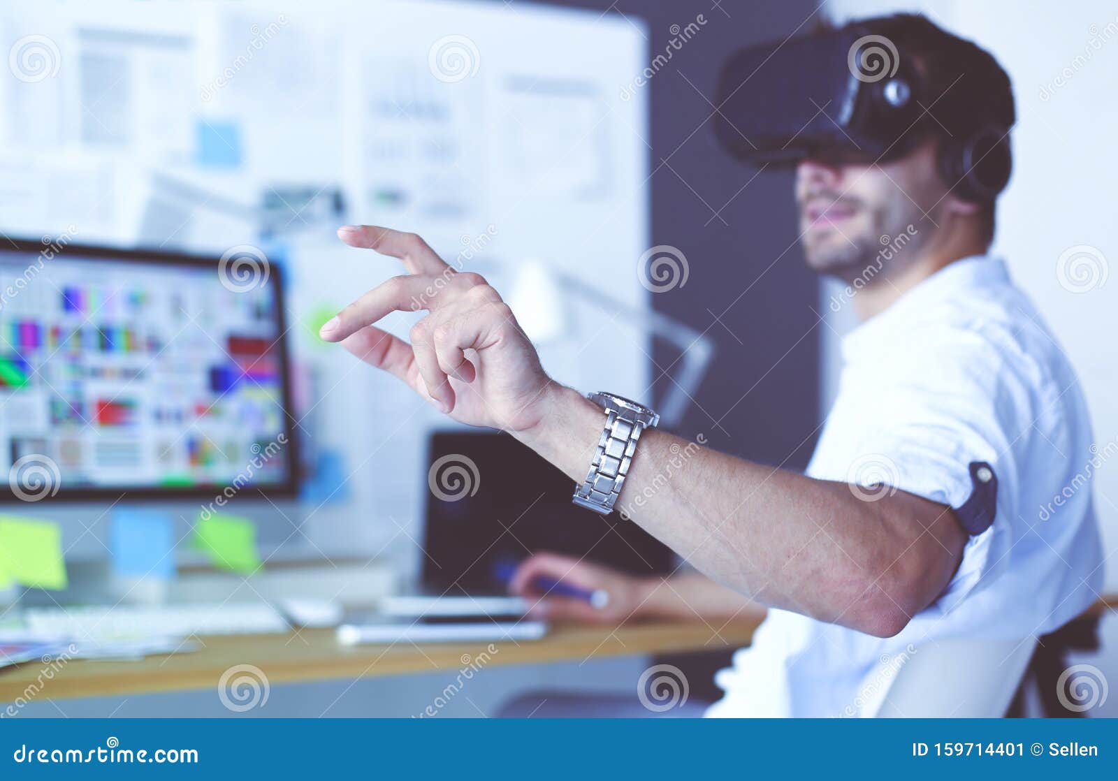 Young Male Software Programmer Testing a New App with 3d Virtual ...