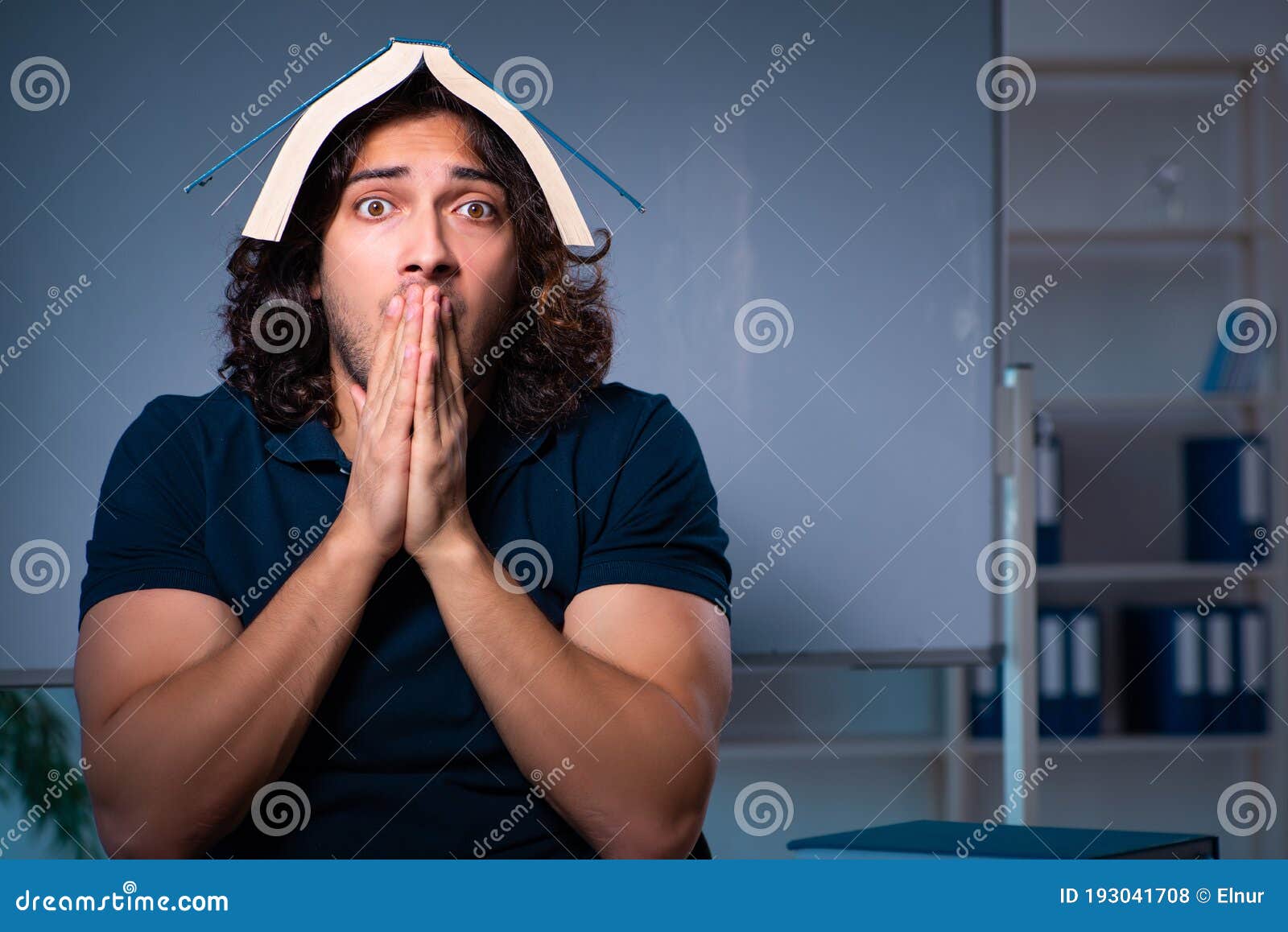 Young Male Student in the Classroom at Night Stock Photo - Image of ...