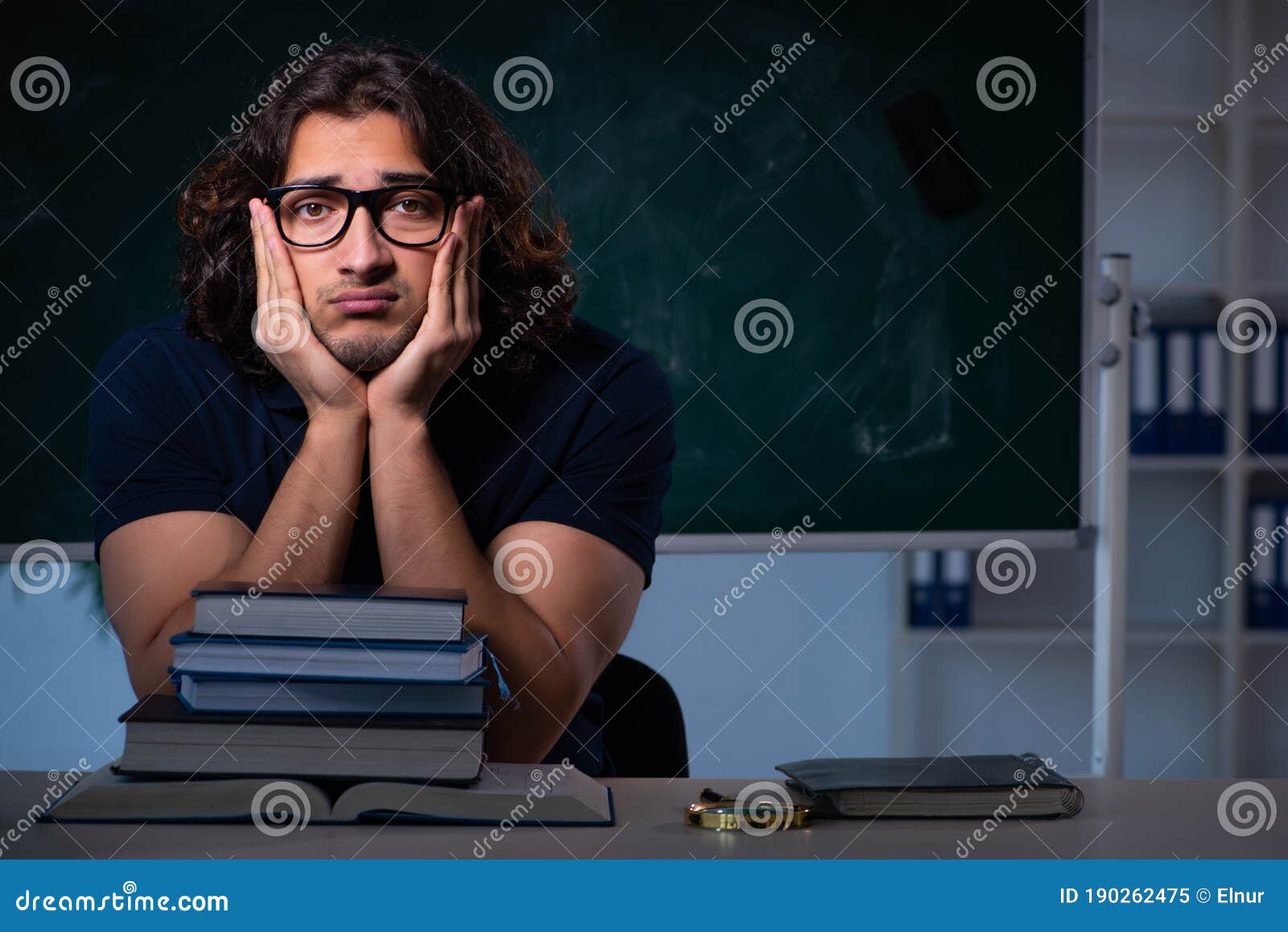 Young Male Student in the Classroom at Night Stock Image - Image of ...