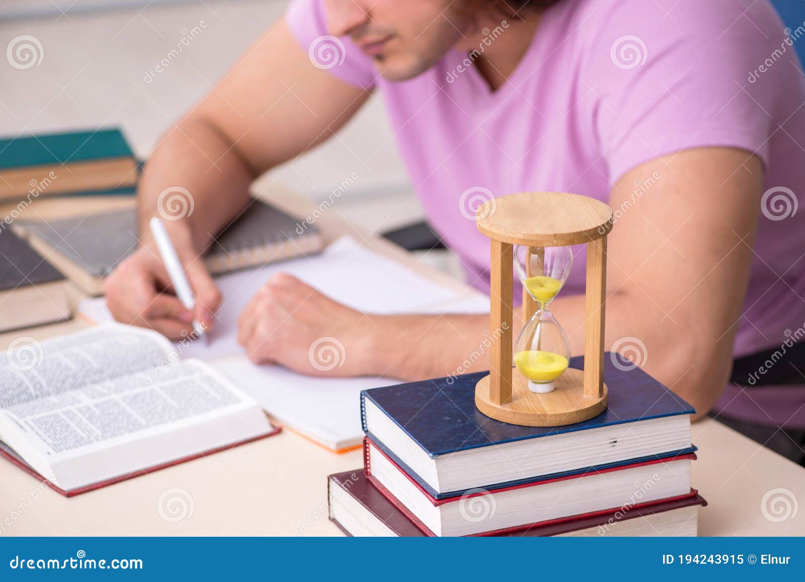 Young Male Student in the Classroom at Time Management Concept Stock ...