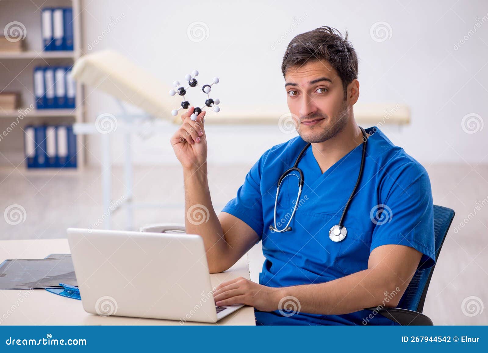 Young Male Student Doctor Holding Molecular Model Stock Photo - Image ...