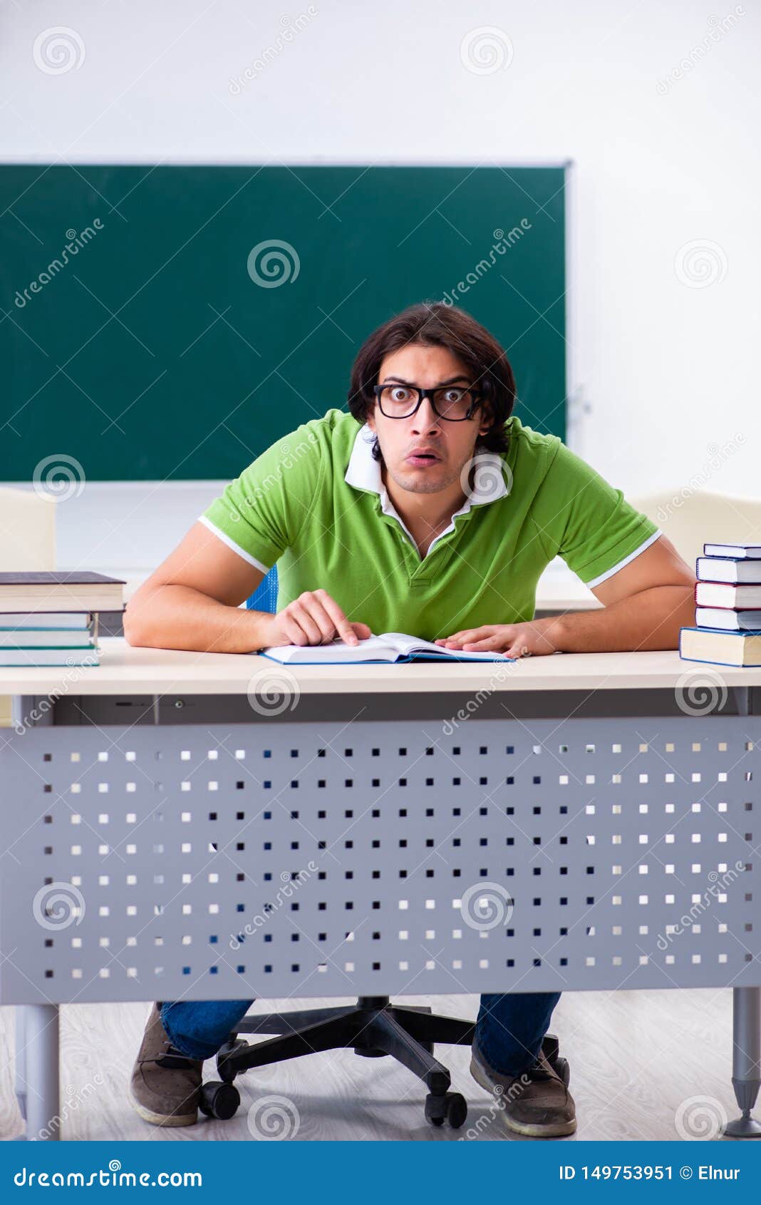 Young Male Student in Front of Green Board Stock Image - Image of ...