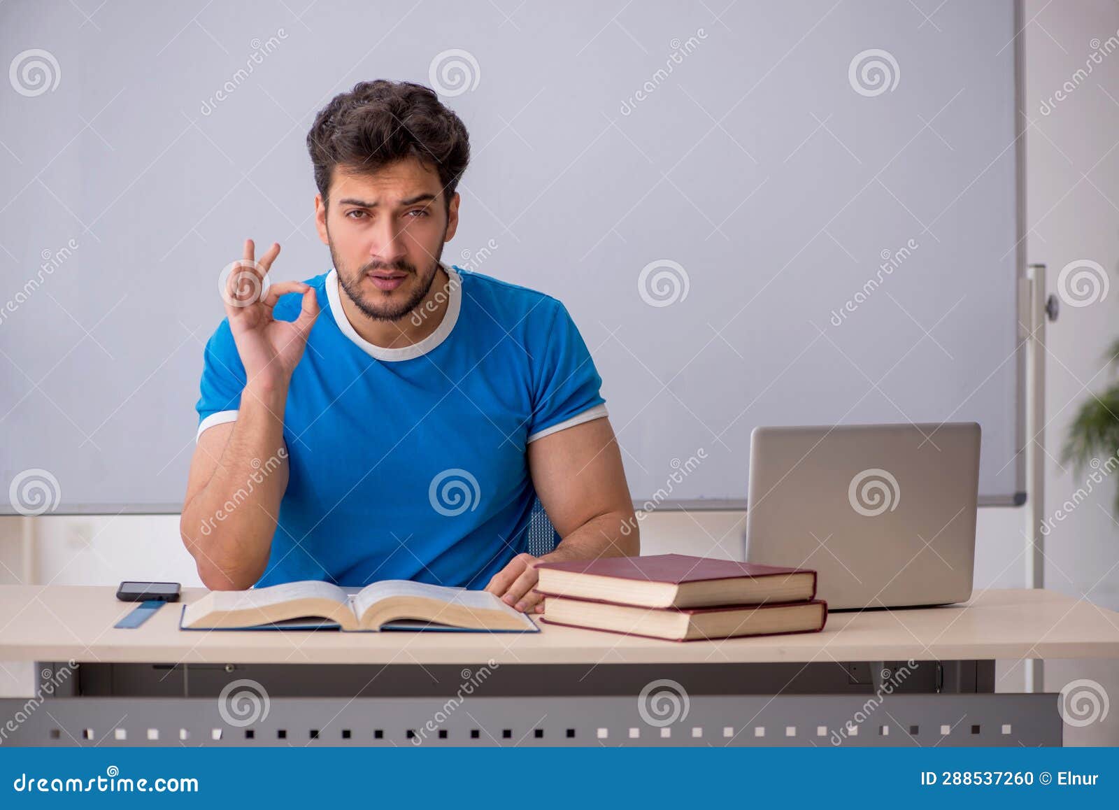 Young Male Student in Front of Whiteboard Stock Photo - Image of ...