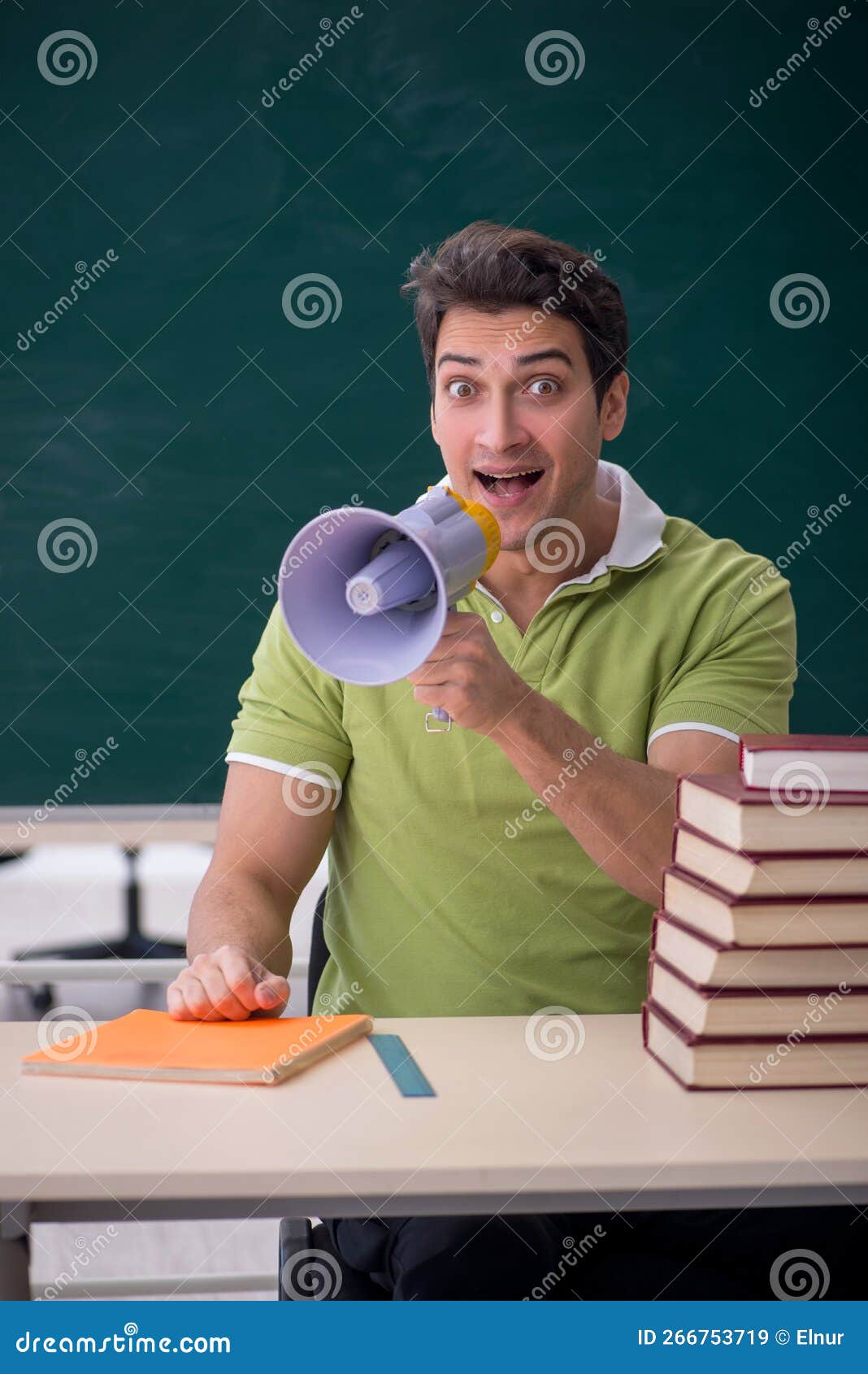Young Male Student Holding Megaphone in the Classroom Stock Image ...