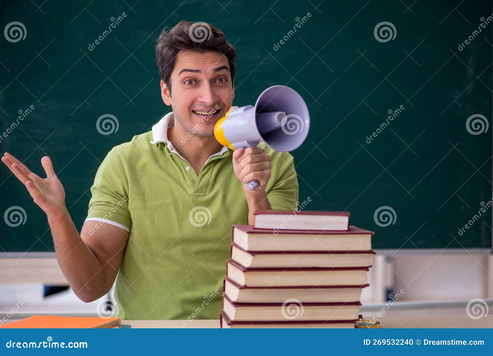 Young Male Student Holding Megaphone in the Classroom Stock Photo ...