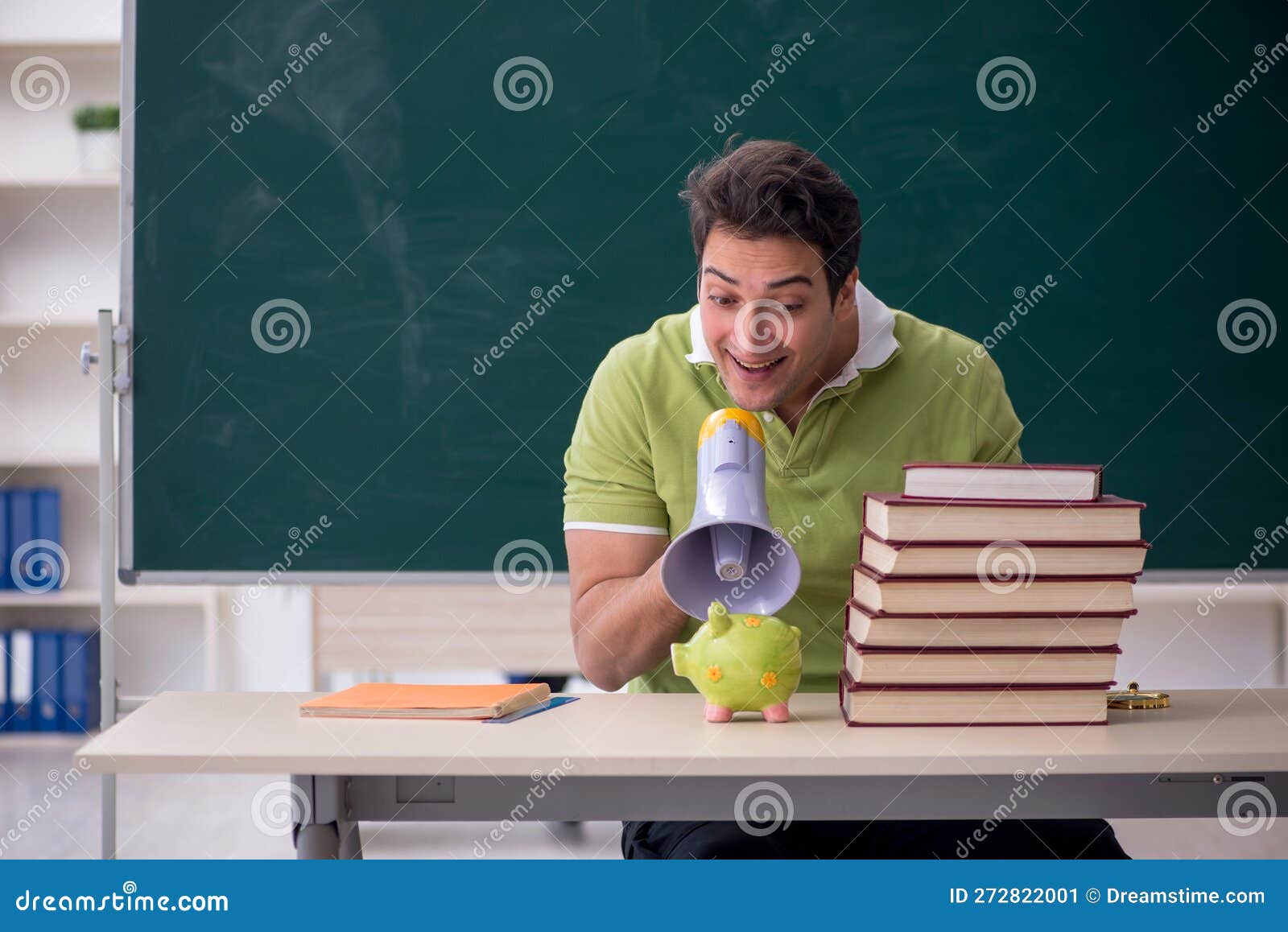 Young Male Student Holding Megaphone in the Classroom Stock Image ...