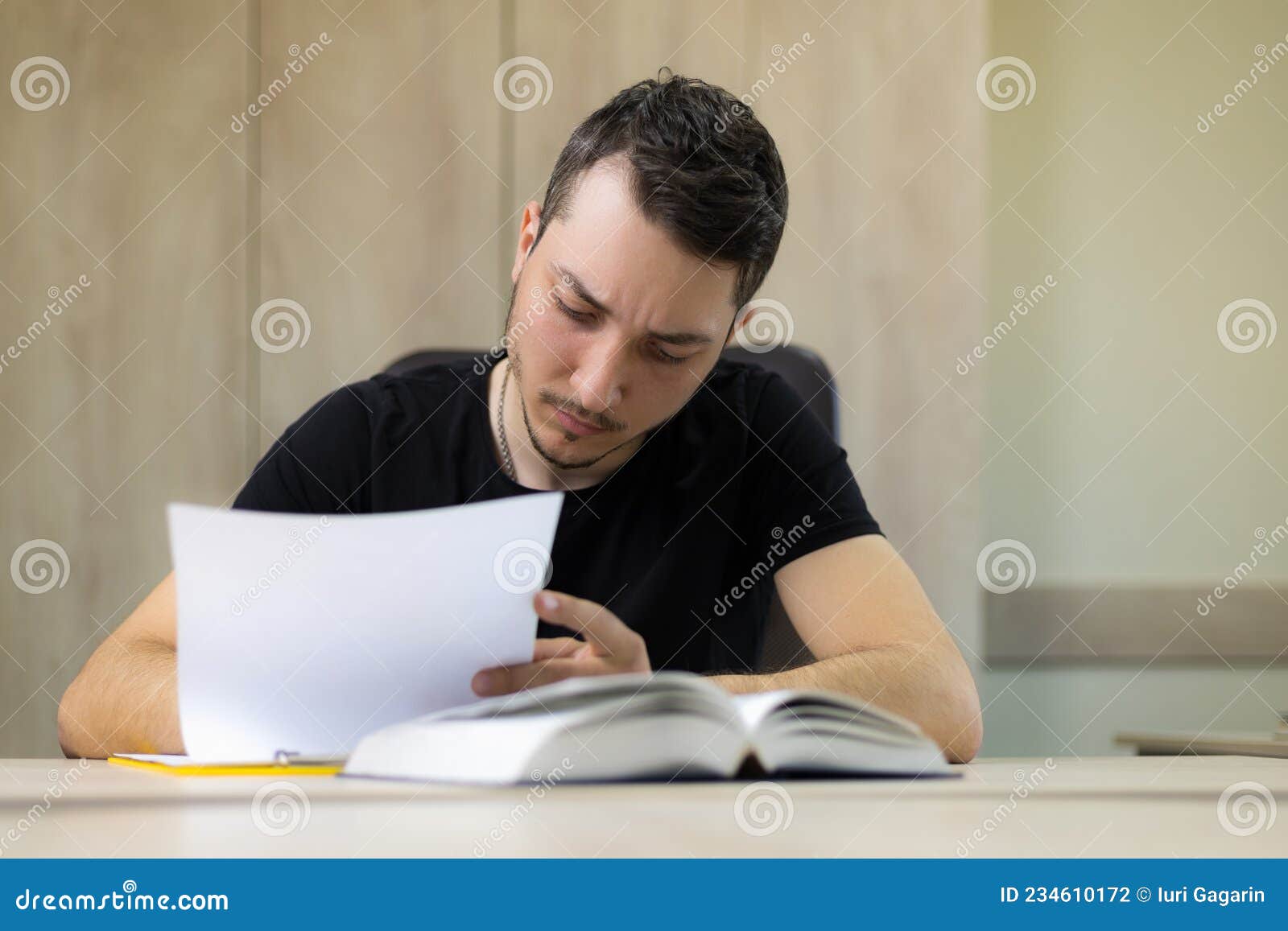 Male Student in the Learning Process with a Pen and Abstract Stock ...