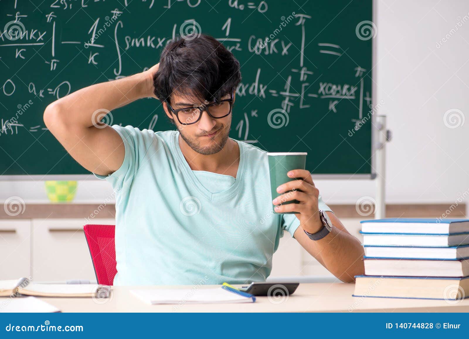 The Young Male Student Mathematician in Front of Chalkboard Stock Photo ...