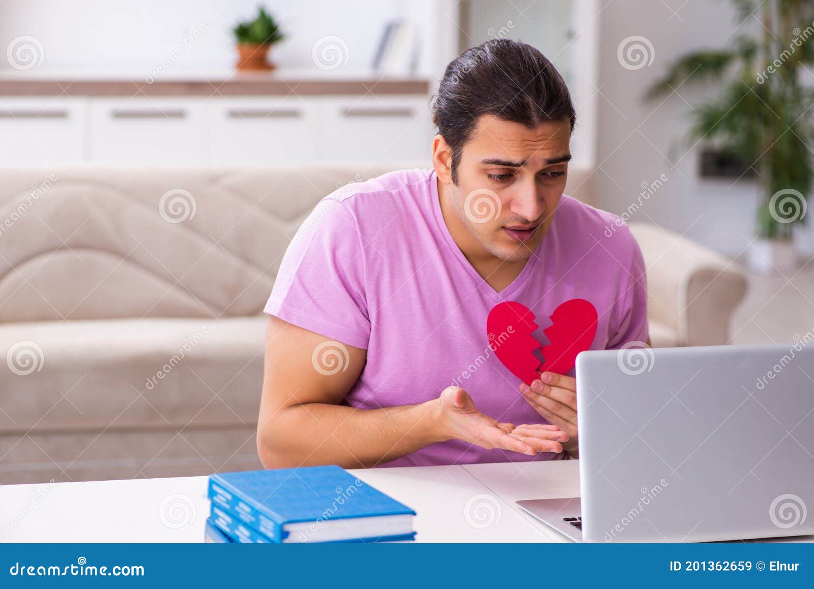 Young Male Student in One-sided Love Concept at Home Stock Image ...