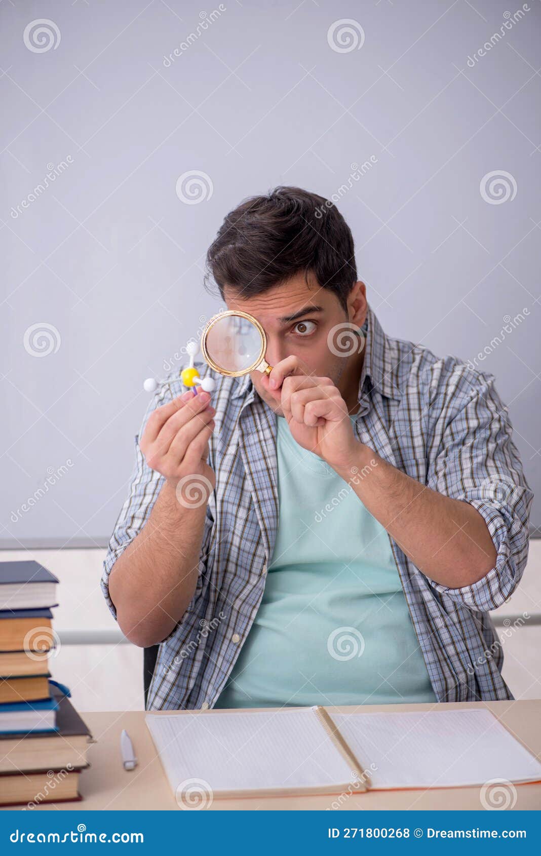 Young Male Student Physicist Sitting in the Classroom Stock Photo ...