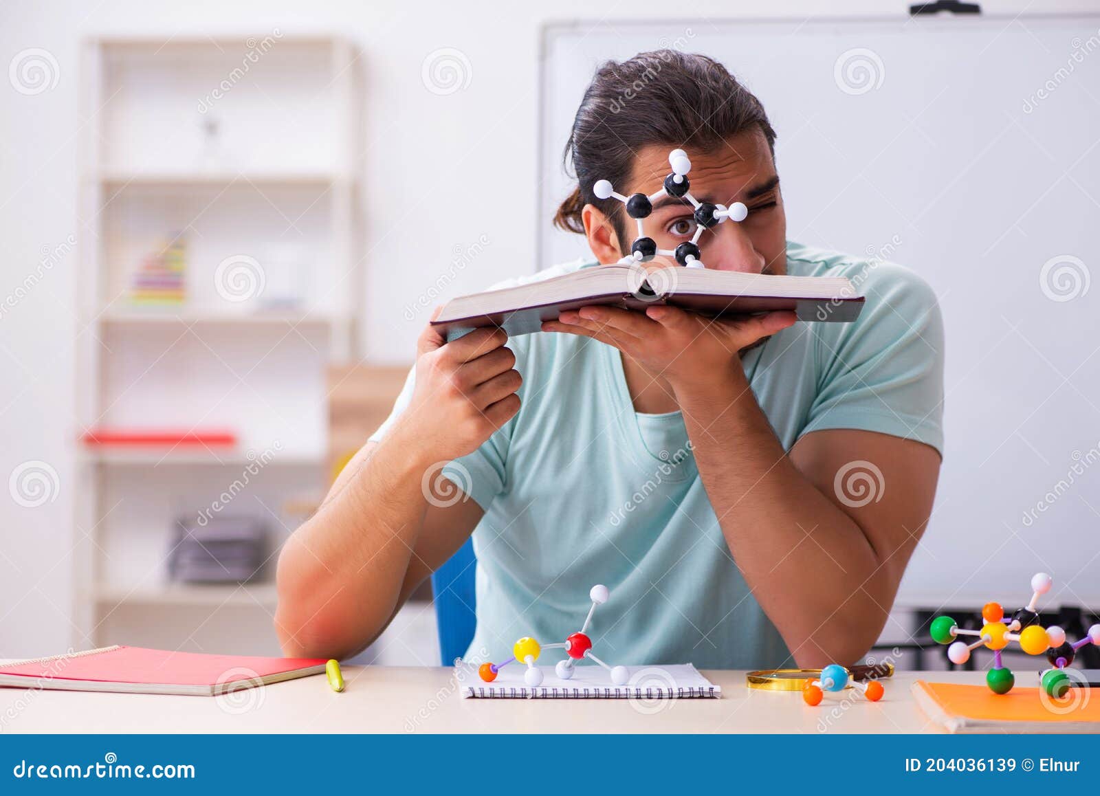 Young Male Student Physicist Studying Molecular Model at Home Stock ...
