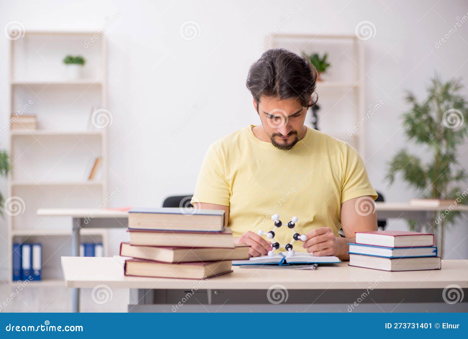 Young Male Student Physics Looking at Molecular Model Stock Image ...