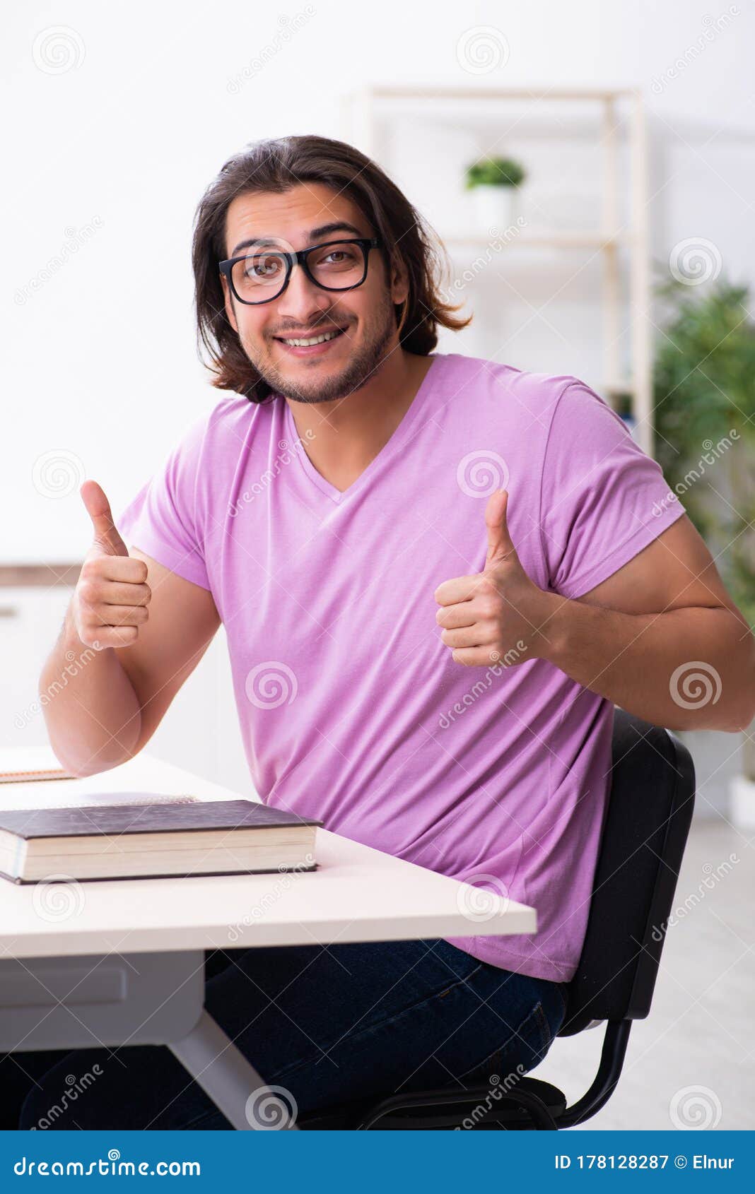 Young Male Student Preparing for Exams at Classroom Stock Image - Image ...