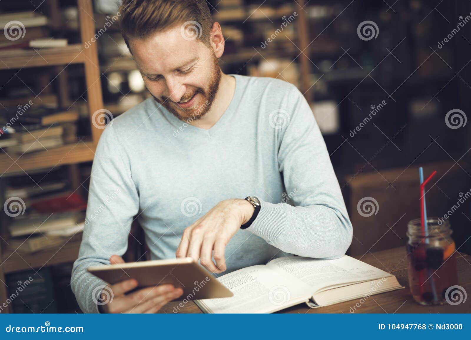 Young Male Student Reading in Coffee Shop Stock Photo - Image of ... Young Male Student Reading in Coffee Shop Stock Photo - Image of ...