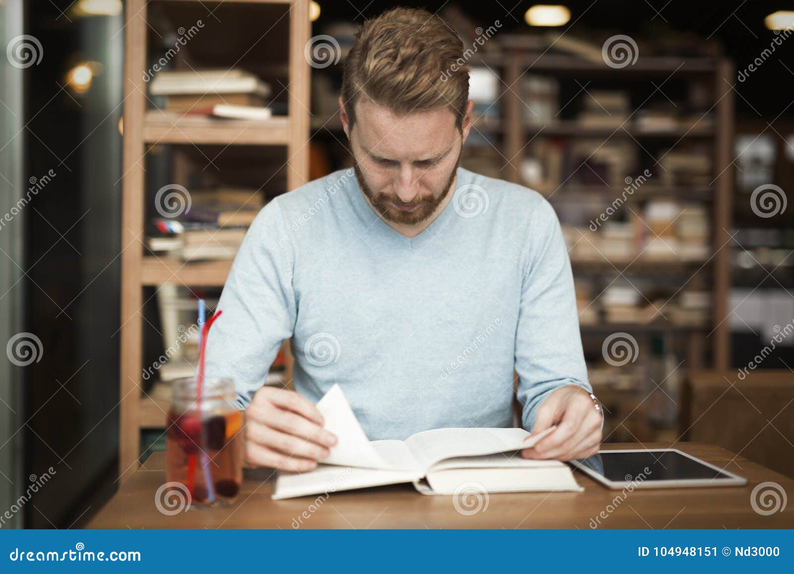 Young Male Student Reading in Coffee Shop Stock Image - Image of ... Young Male Student Reading in Coffee Shop Stock Image - Image of ...