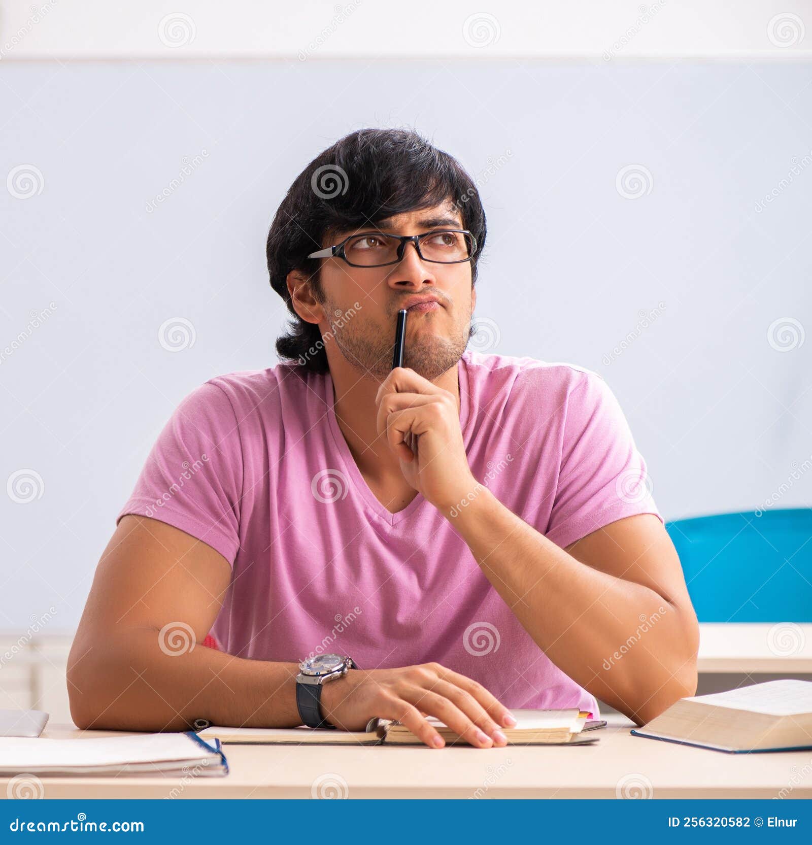 Young Male Student Sitting in the Class Stock Photo - Image of homework ...