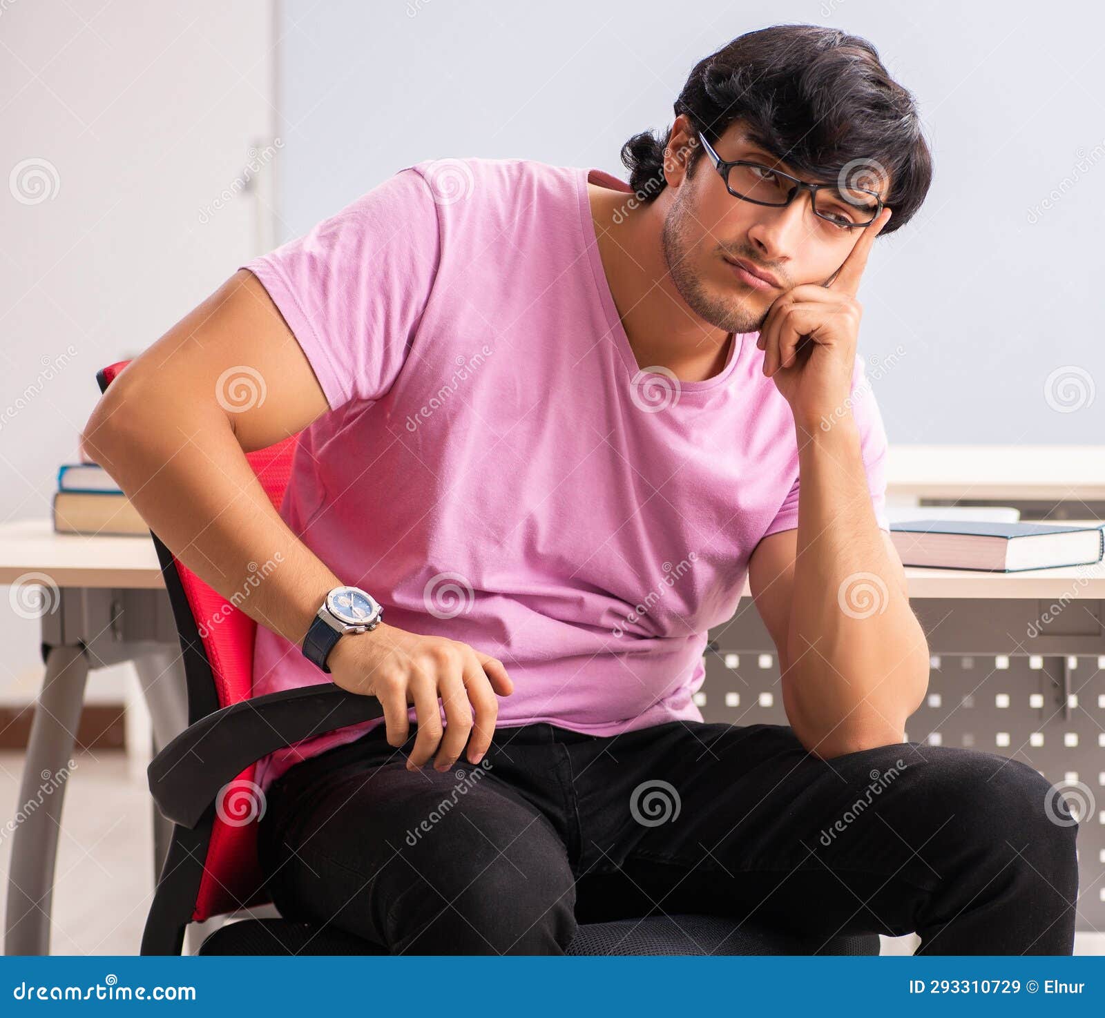 Young Male Student Sitting in the Class Stock Image - Image of ...