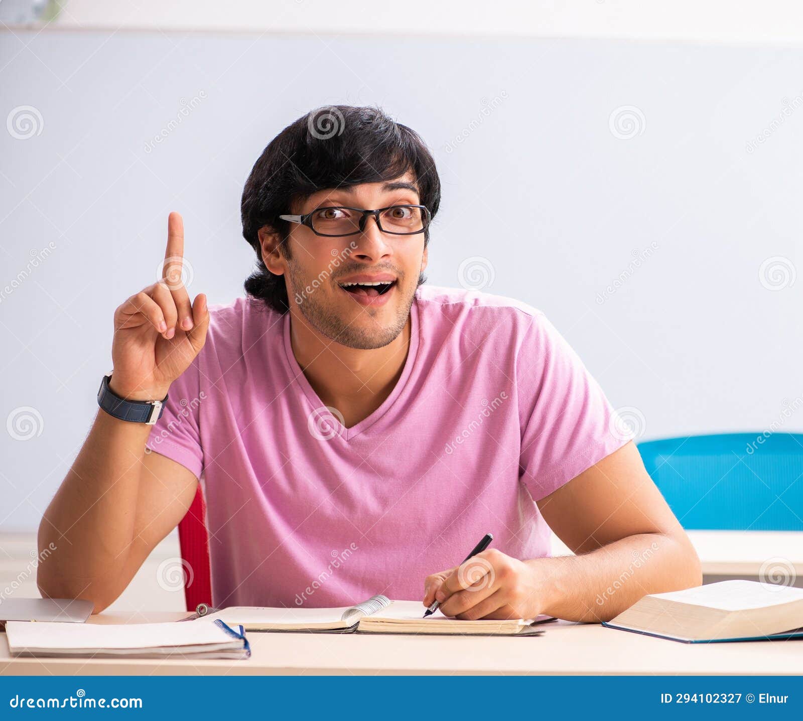 Young Male Student Sitting in the Class Stock Image - Image of ...