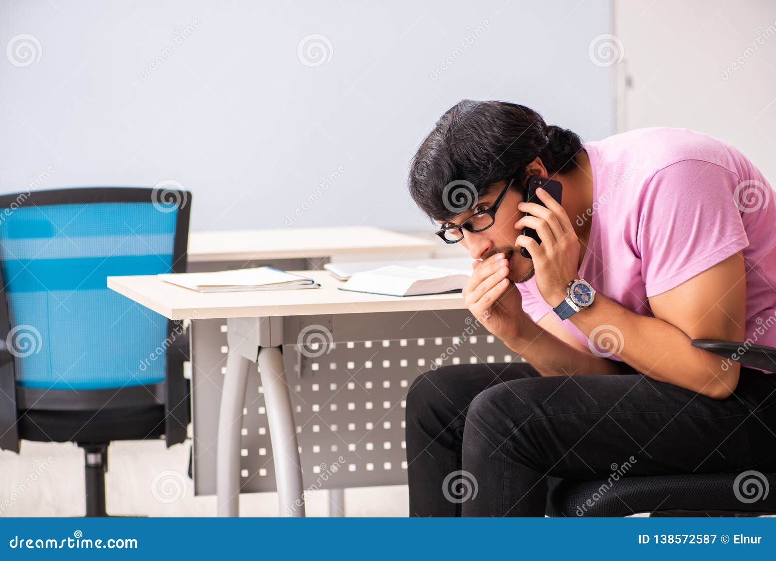 The Young Male Student Sitting in the Class Stock Image - Image of ...