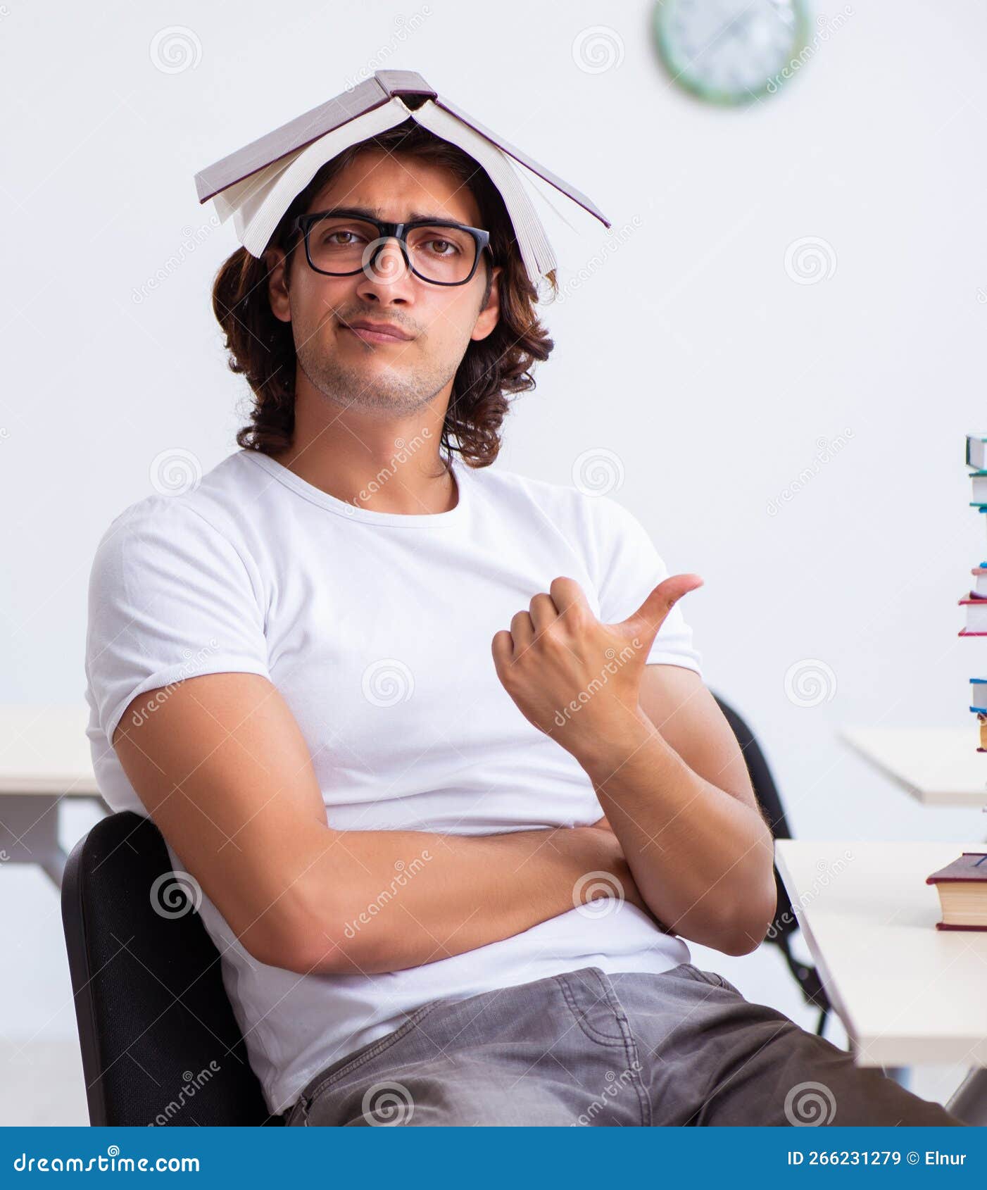 Young Male Student Sitting in the Classroom Stock Image - Image of ...