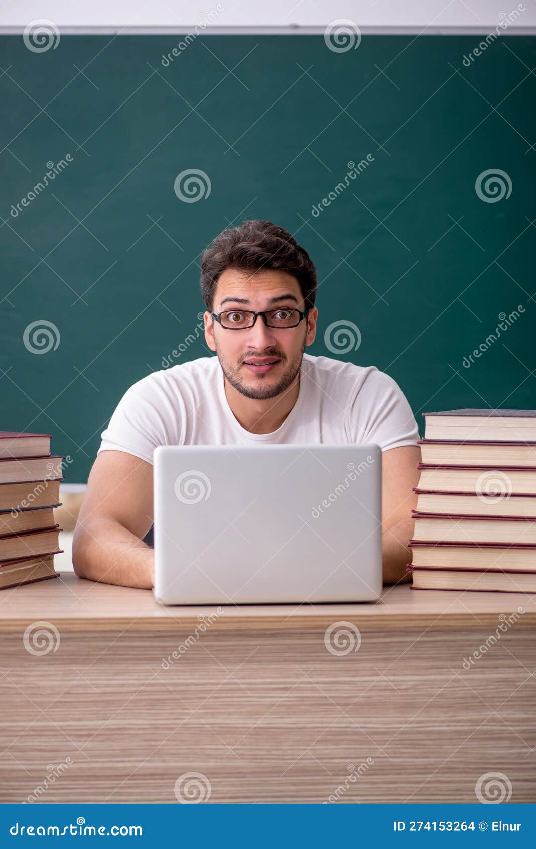 Young Male Student Sitting in the Classroom Stock Photo - Image of ...