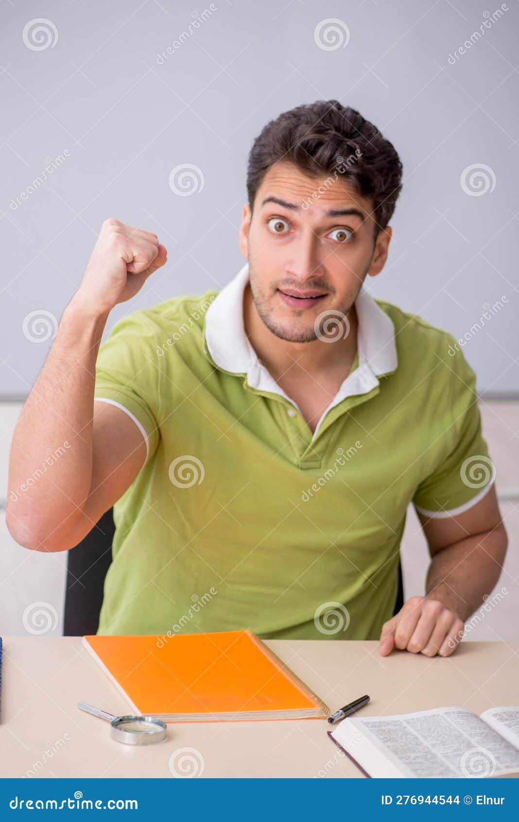 Young Male Student Sitting in the Classroom Stock Photo - Image of ...