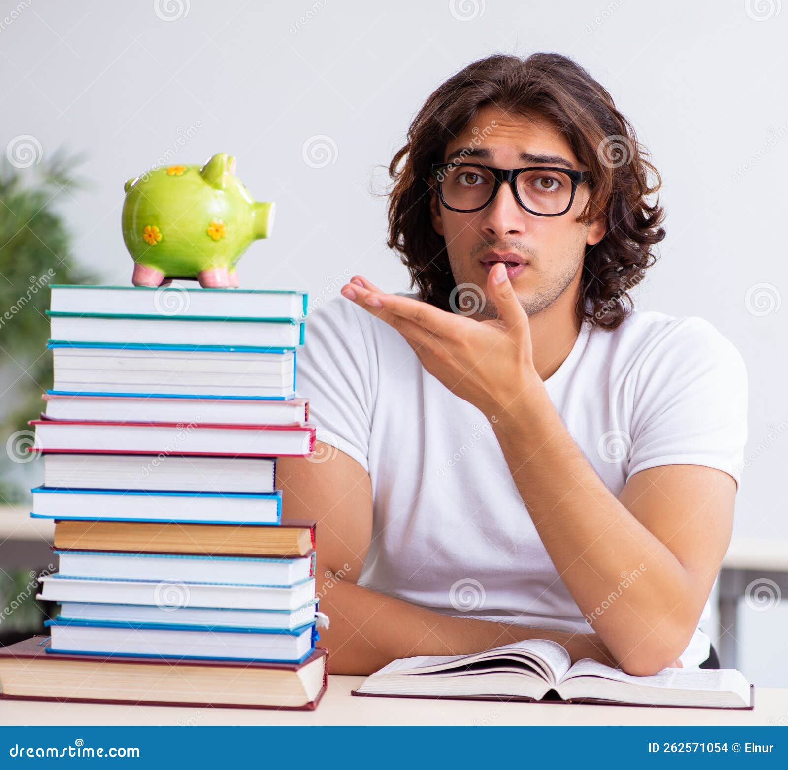 Young Male Student Sitting in the Classroom Stock Photo - Image of ... Young Male Student Sitting in the Classroom Stock Photo - Image of ...