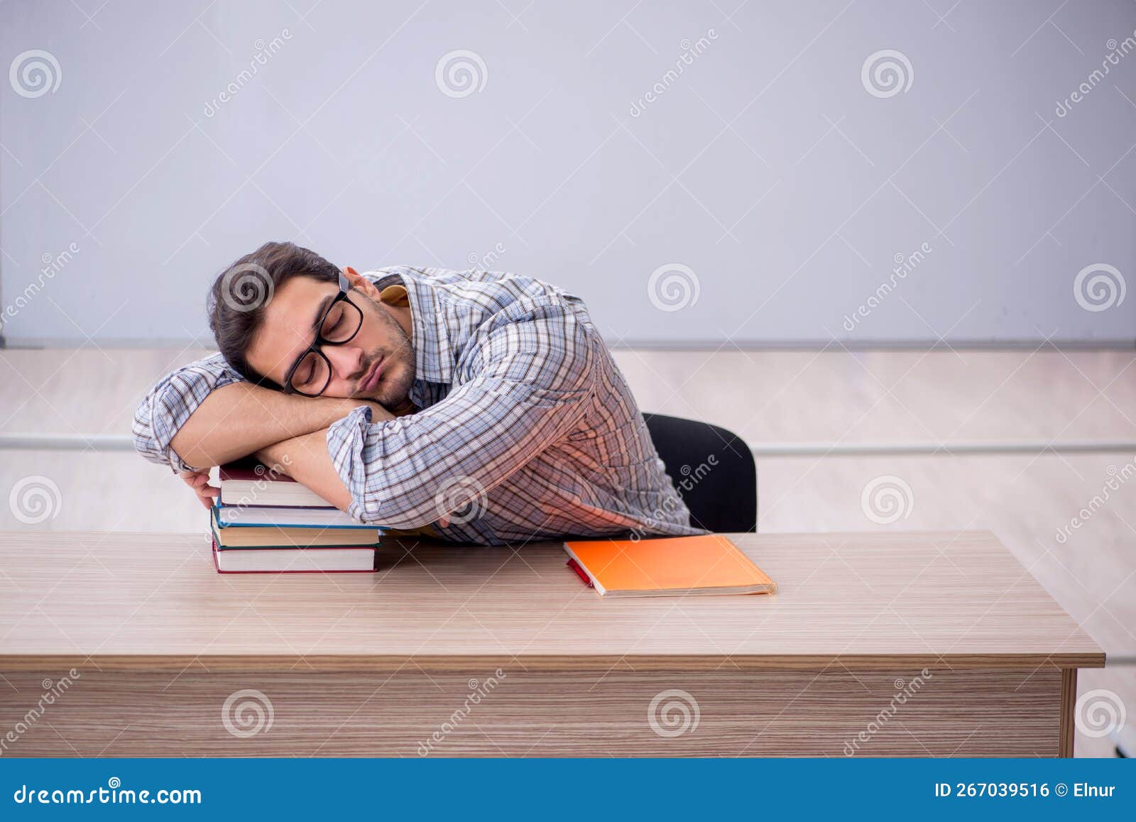 Young Male Student Sitting in the Classroom Stock Photo - Image of ...
