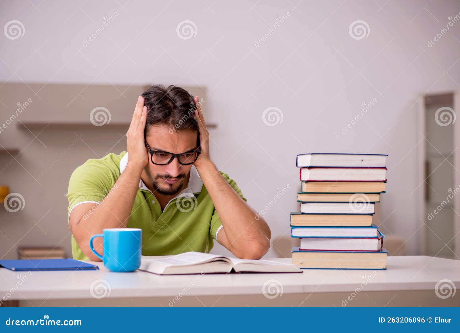 Young Male Student Studying at Home Stock Photo - Image of preparation ...