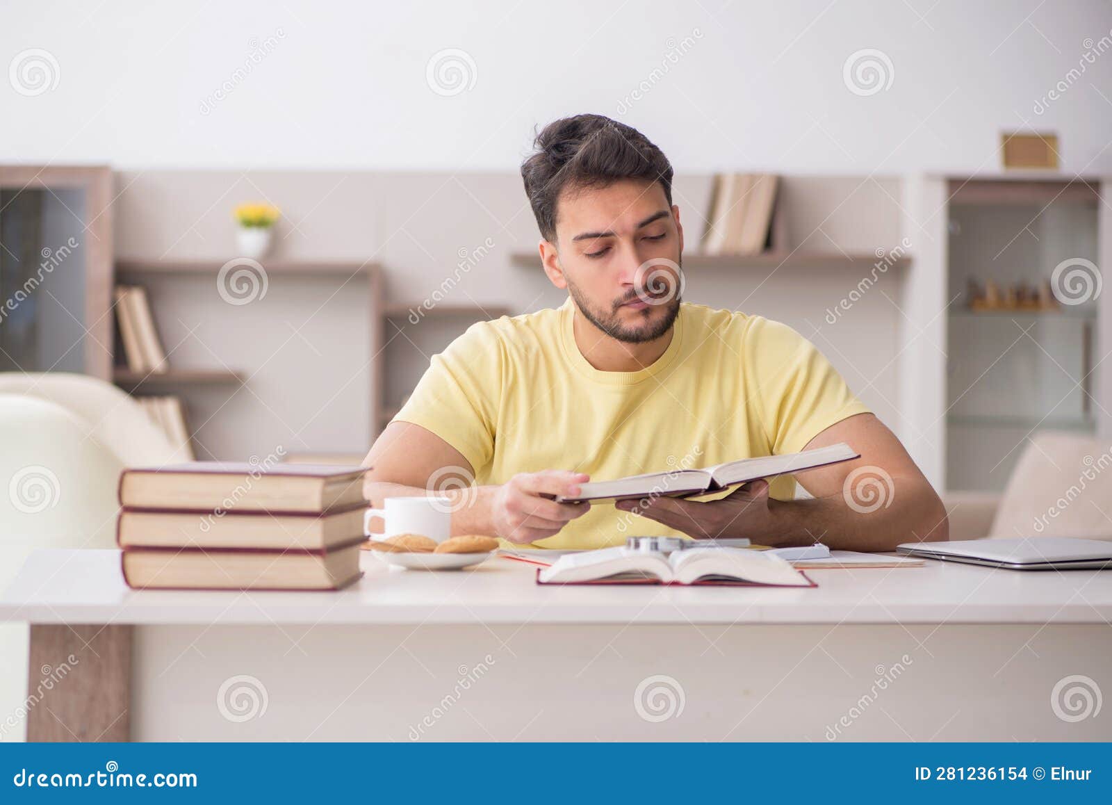 Young Male Student Studying at Home Stock Photo - Image of research ...