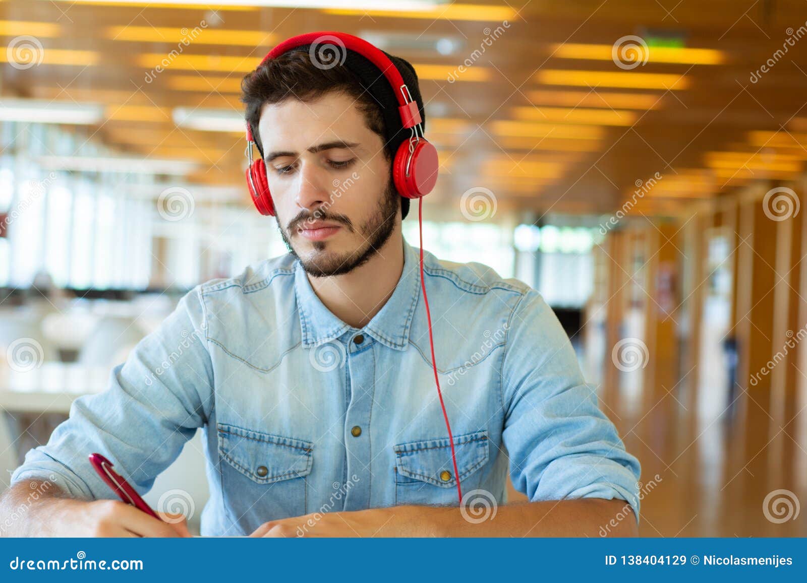 Young Male Student Studying in the Library Stock Image - Image of ...