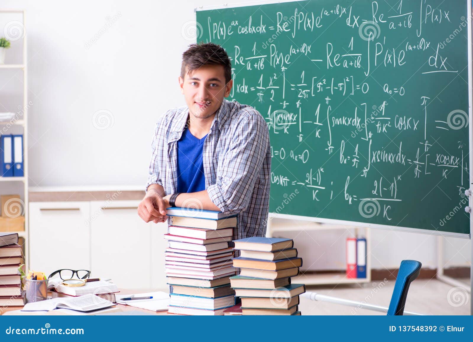 The Young Male Student Studying Math at School Stock Photo - Image of ...