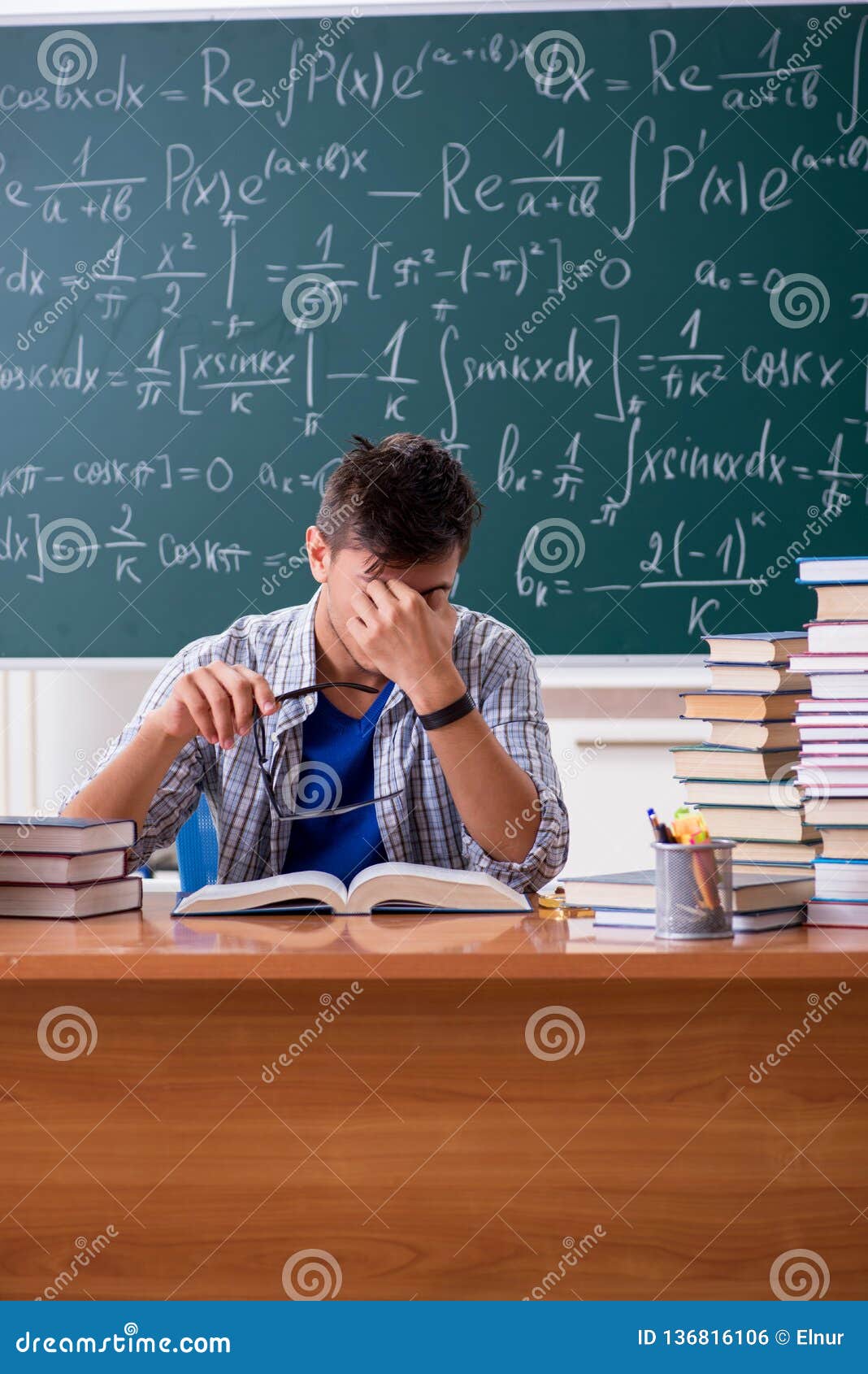 The Young Male Student Studying Math at School Stock Photo - Image of ...