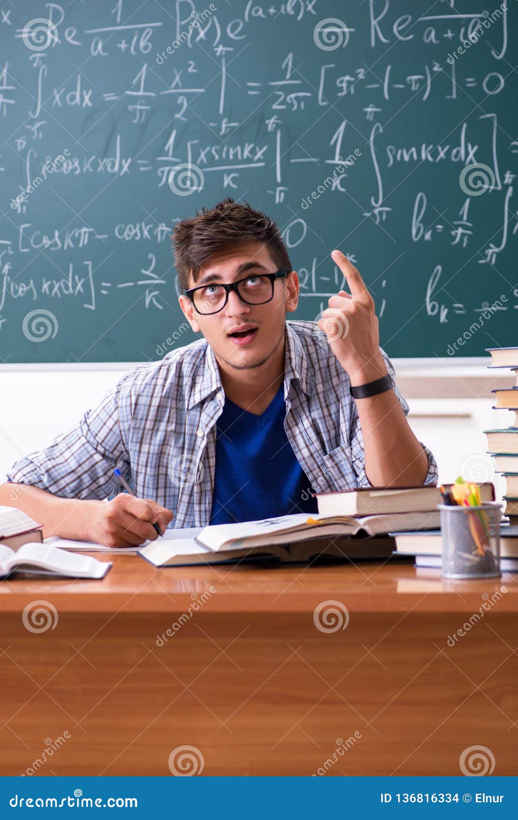 The Young Male Student Studying Math at School Stock Photo - Image of ...