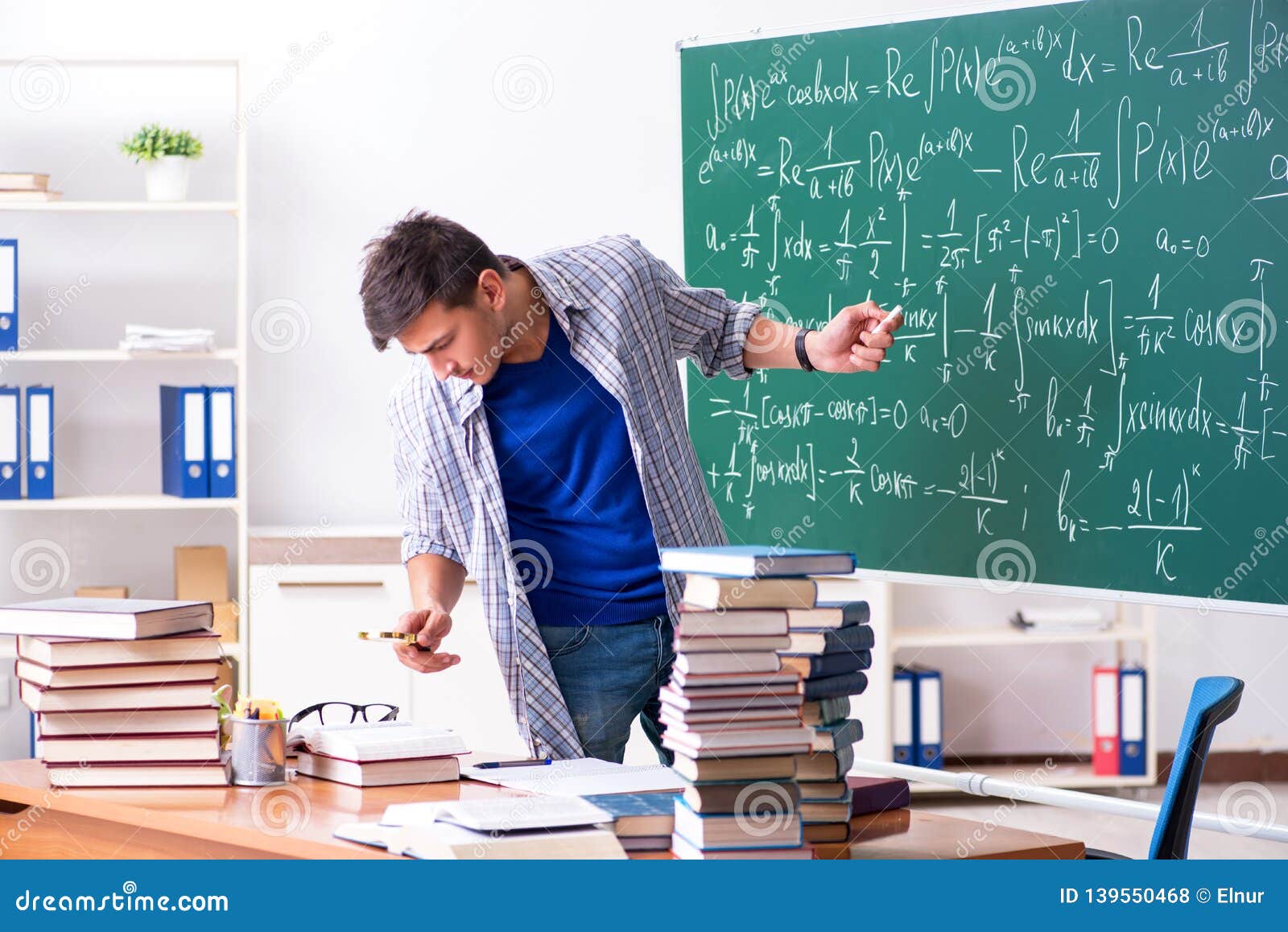 The Young Male Student Studying Math at School Stock Photo - Image of ...