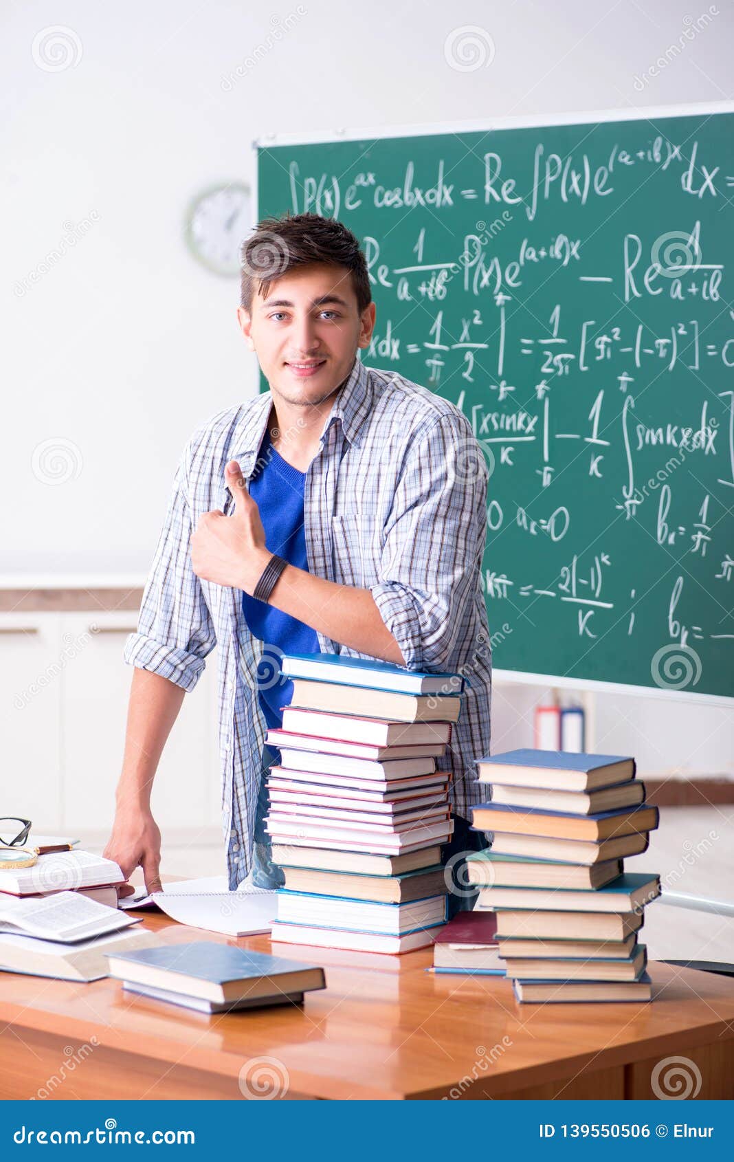 The Young Male Student Studying Math at School Stock Photo - Image of ...