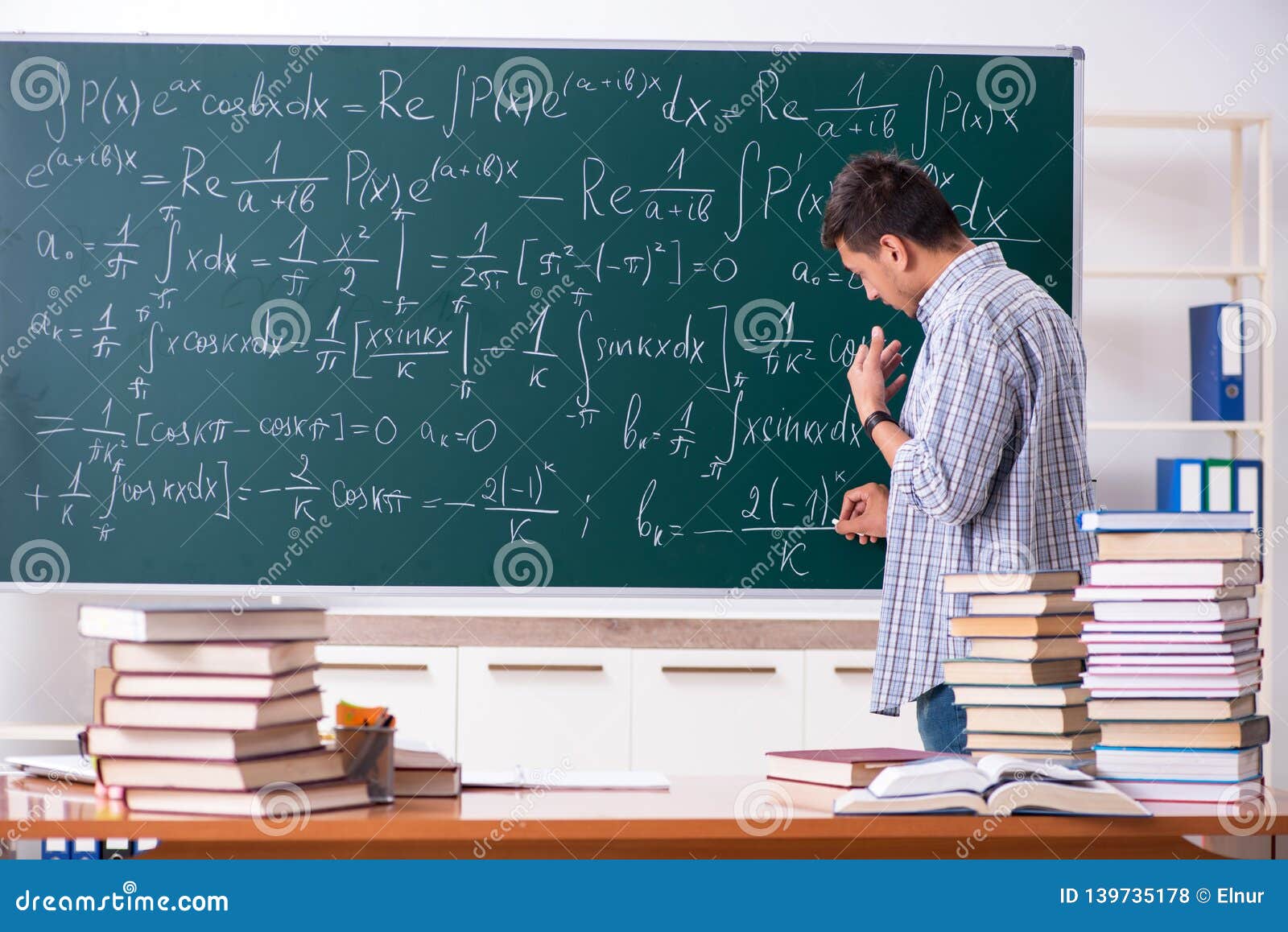 The Young Male Student Studying Math at School Stock Photo - Image of ...