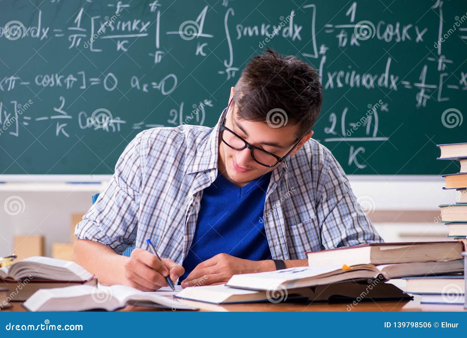 The Young Male Student Studying Math at School Stock Photo - Image of ...