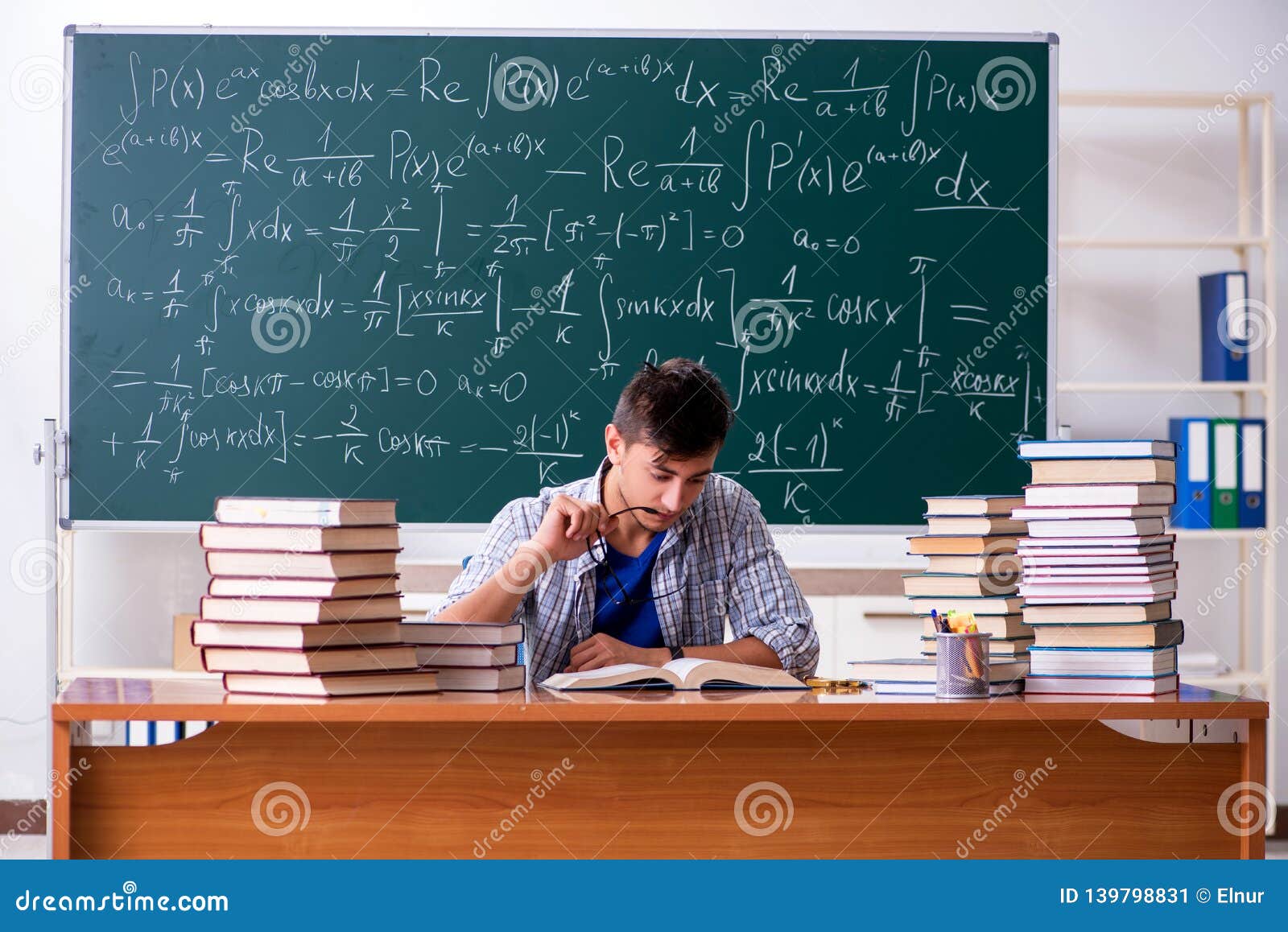 The Young Male Student Studying Math at School Stock Image - Image of ...
