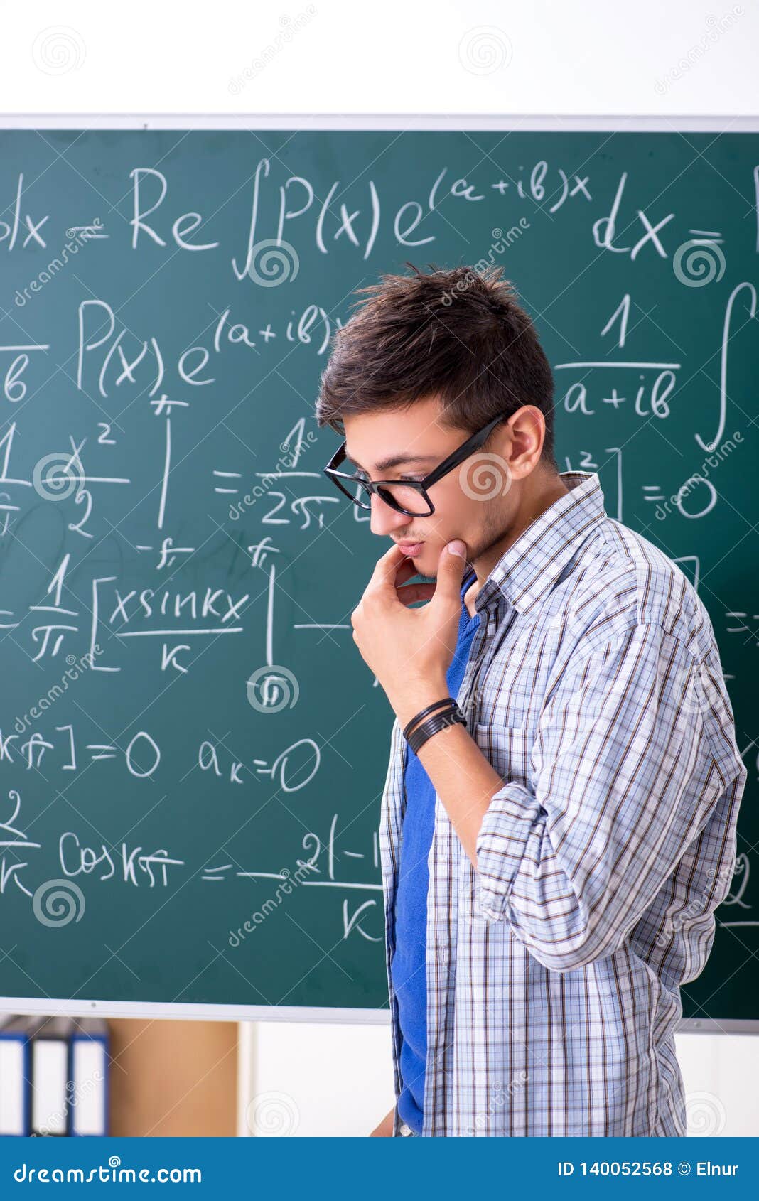The Young Male Student Studying Math at School Stock Photo - Image of ...