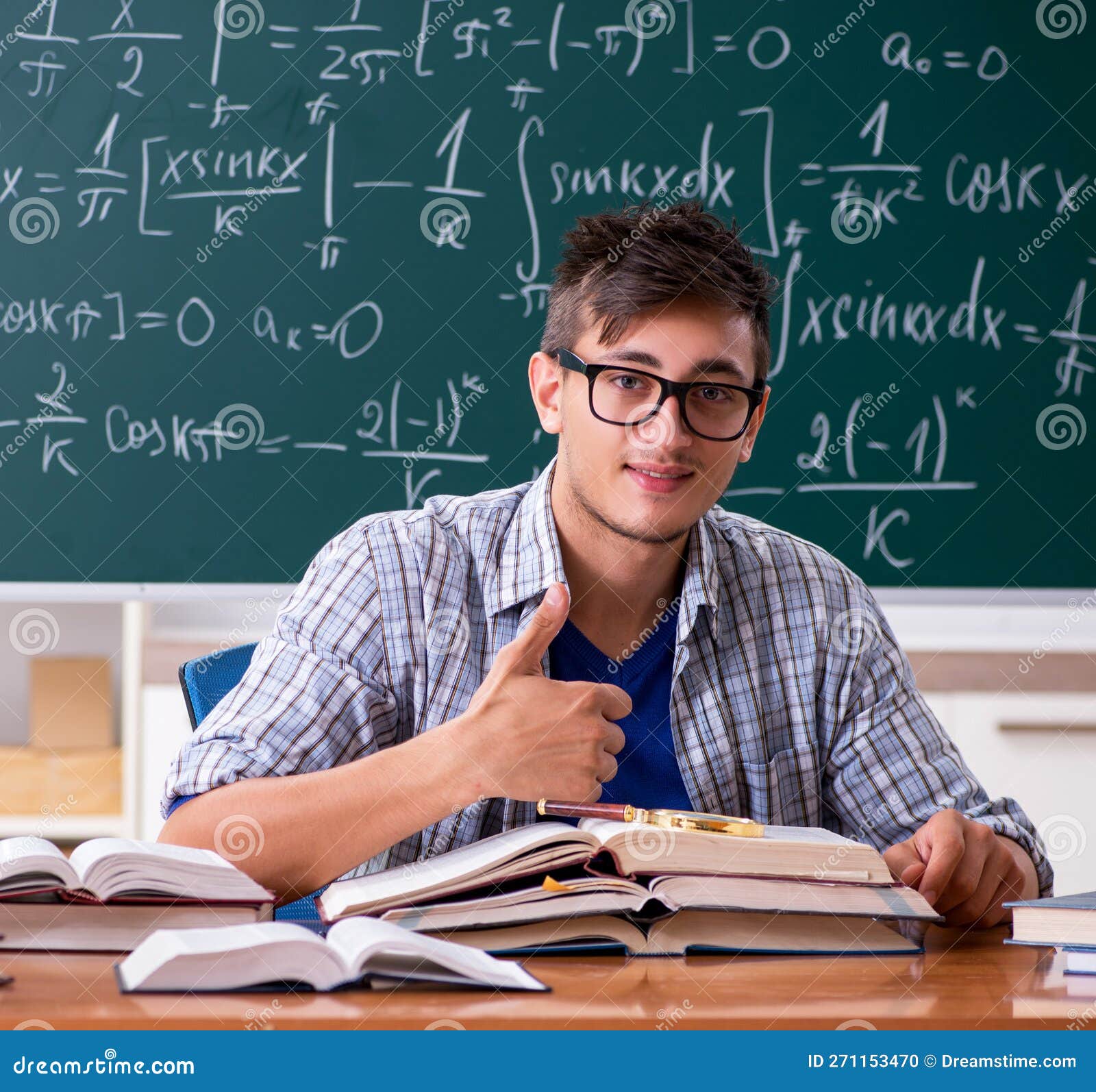 Young Male Student Studying Math at School Stock Photo - Image of ...