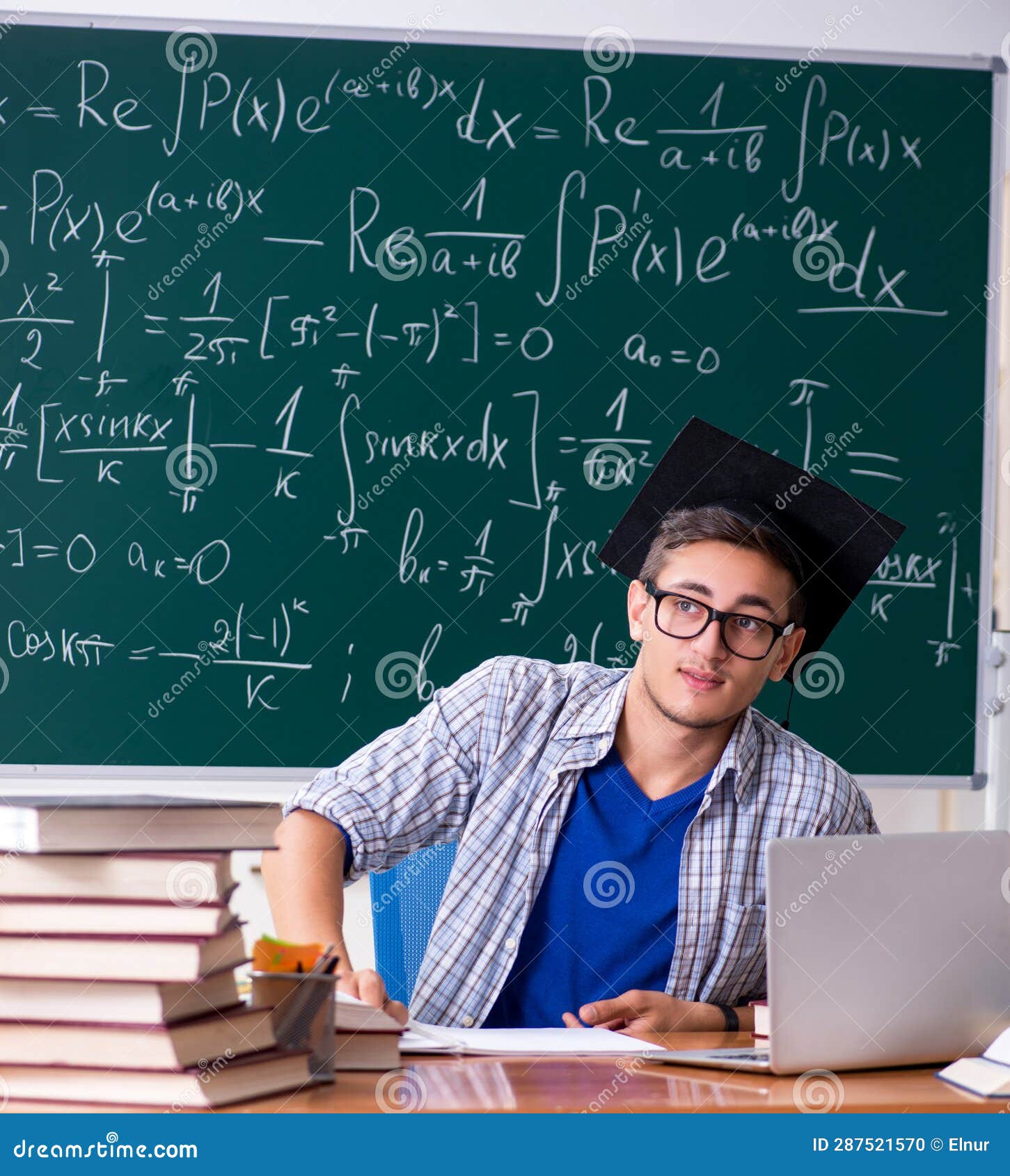 Young Male Student Studying Math at School Stock Photo - Image of board ...