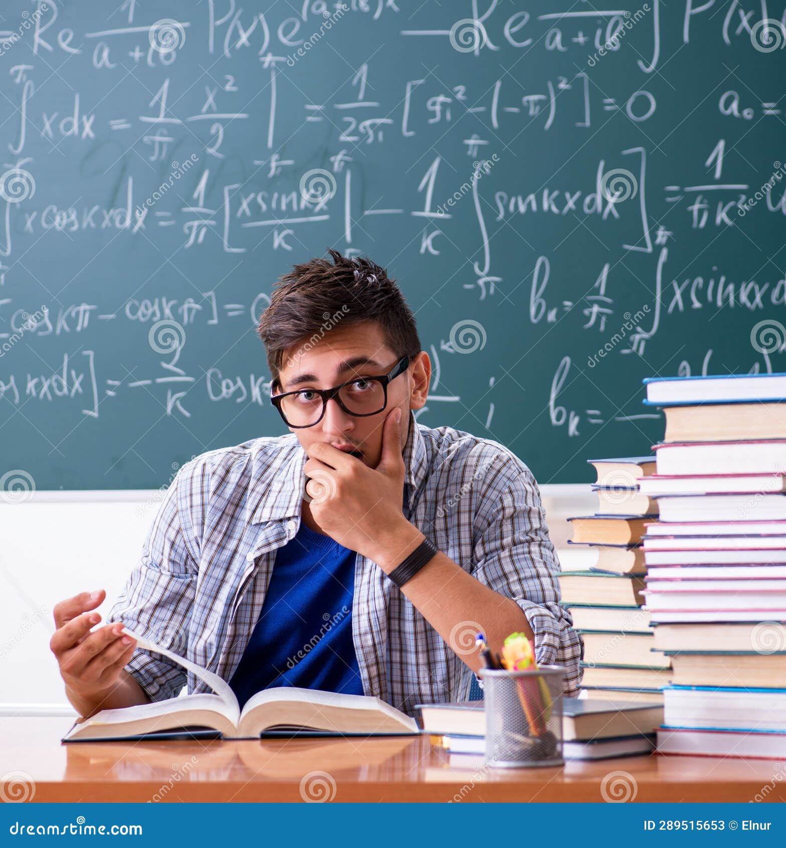 Young Male Student Studying Math at School Stock Image - Image of ...